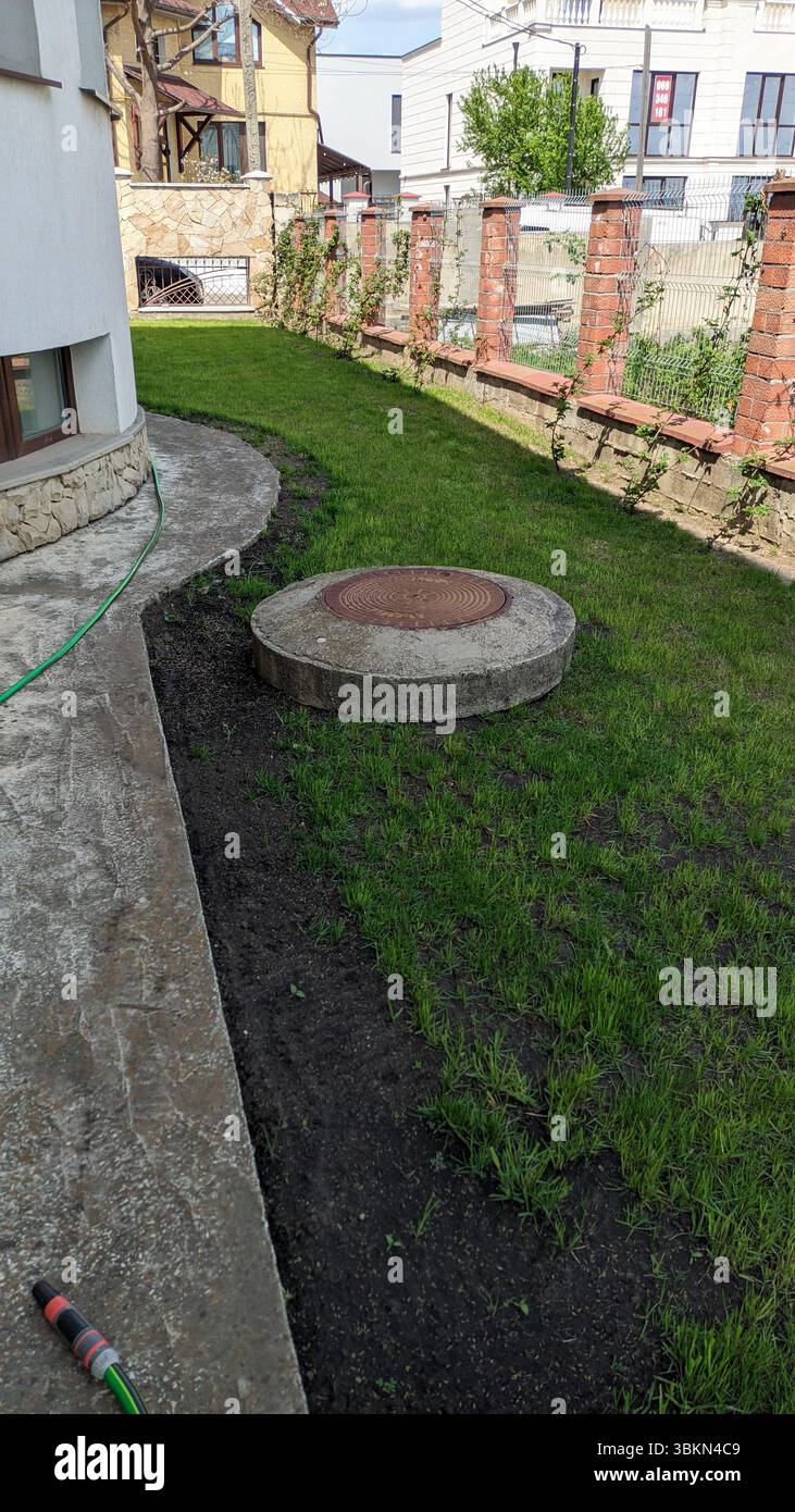 A Beautifully Landscaped Garden Featuring a Unique and Decorative ...