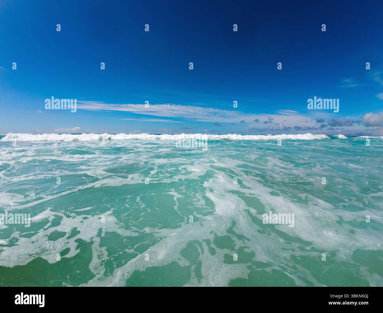 Blue ocean clouds in clear hi-res stock photography and images - Alamy