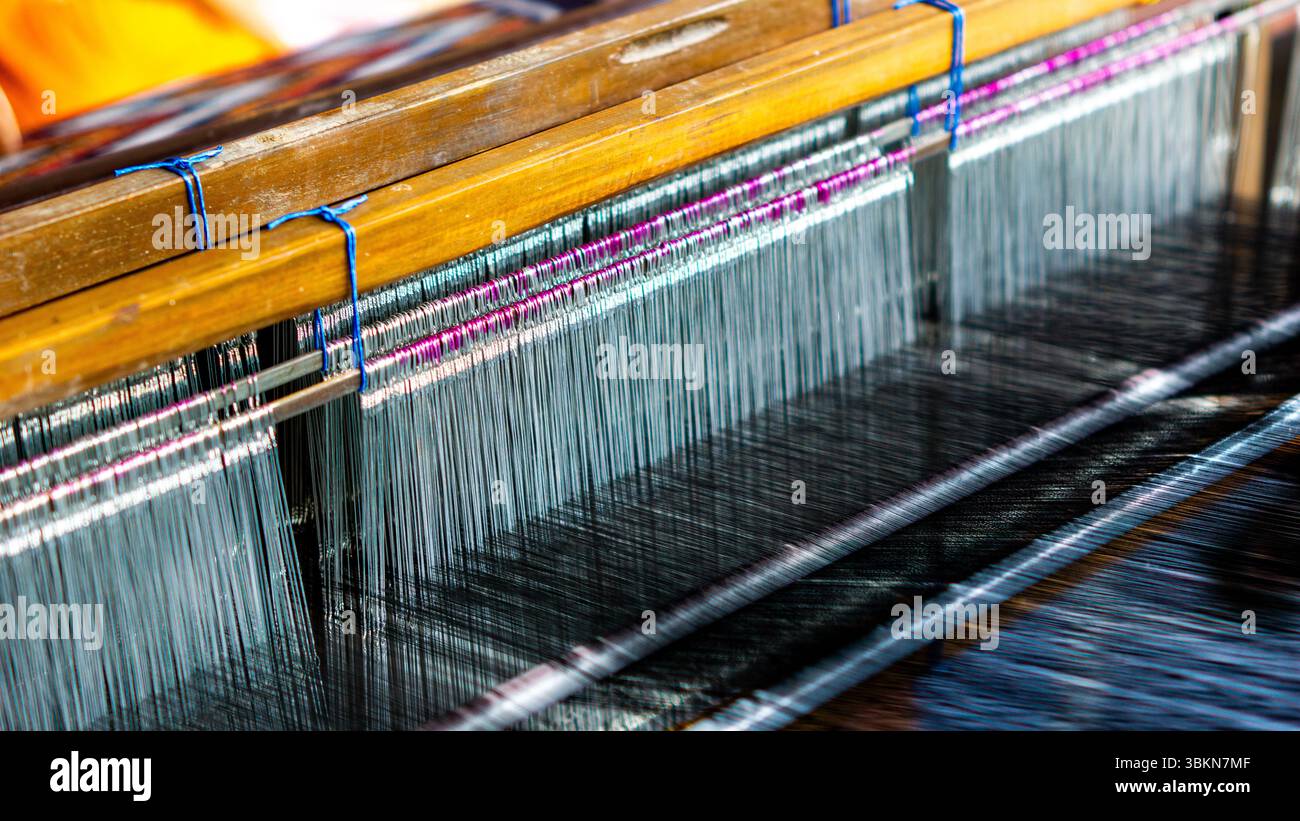Making tenun ikat Bandar, Indonesia. An Indonesian woman weaving ...