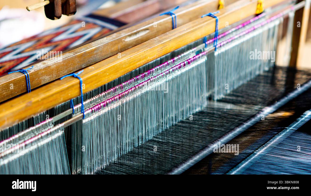 Making tenun ikat Bandar, Indonesia. An Indonesian woman weaving ...