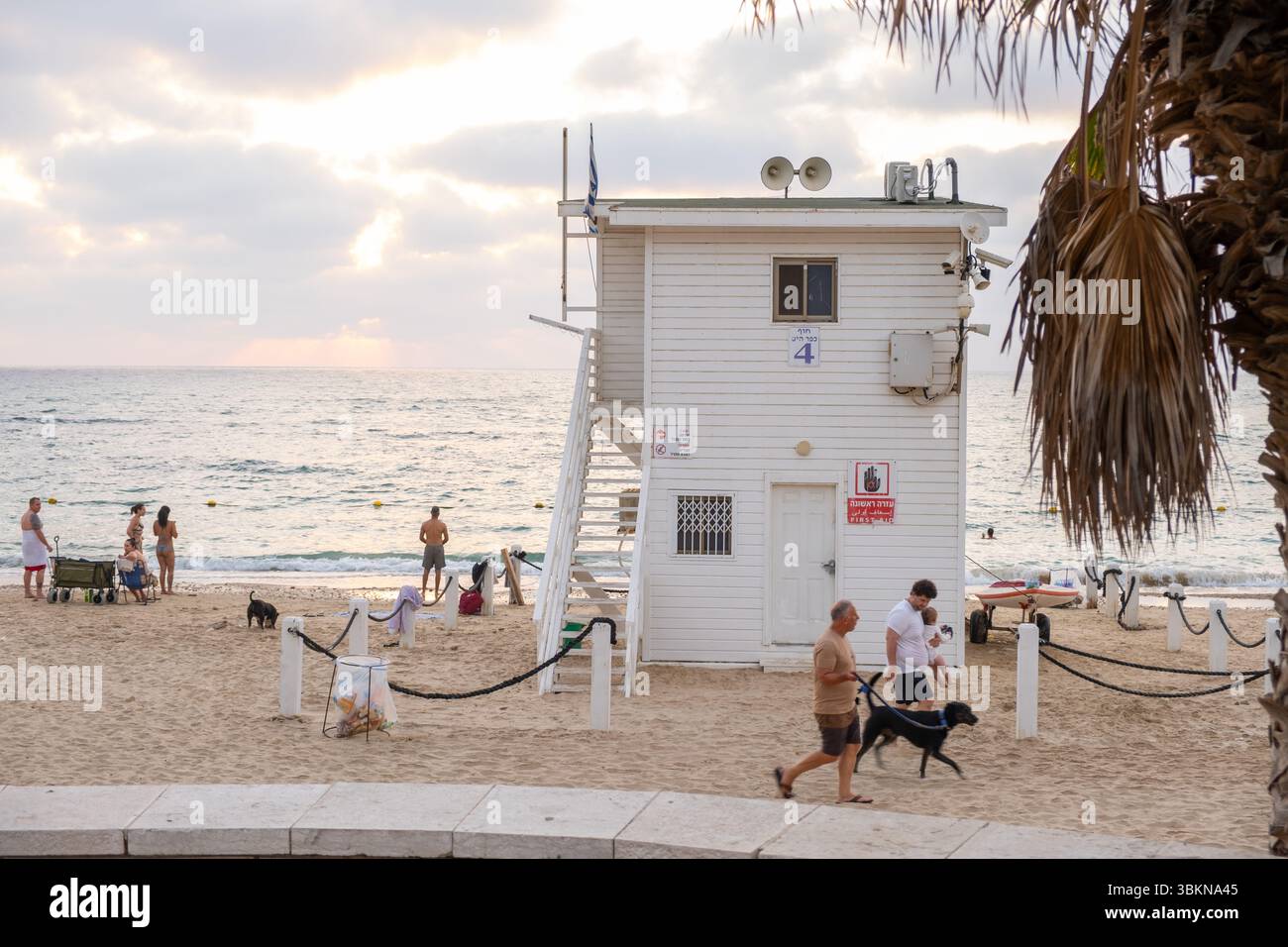 Israel, Hadera Beach, 21 June, 2025, People Swim and Relax on the beach ...