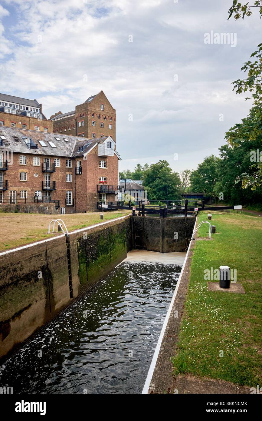 Coxes lock mill buildings by Coxes lock on the River Wey Navigation ...