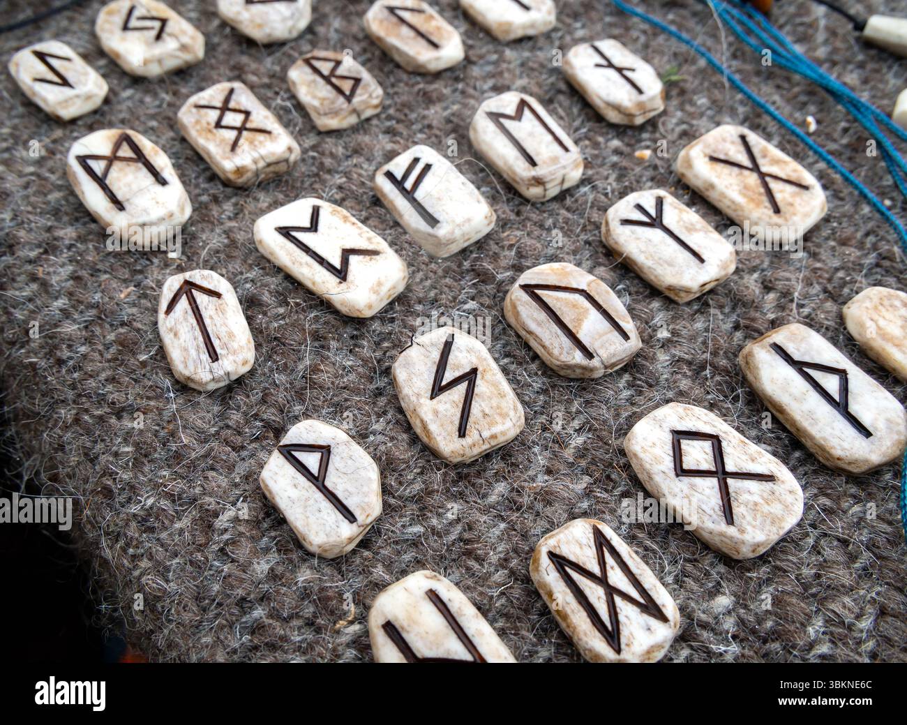 Stone bones with ancient Slavic runic signs applied to them Stock Photo ...