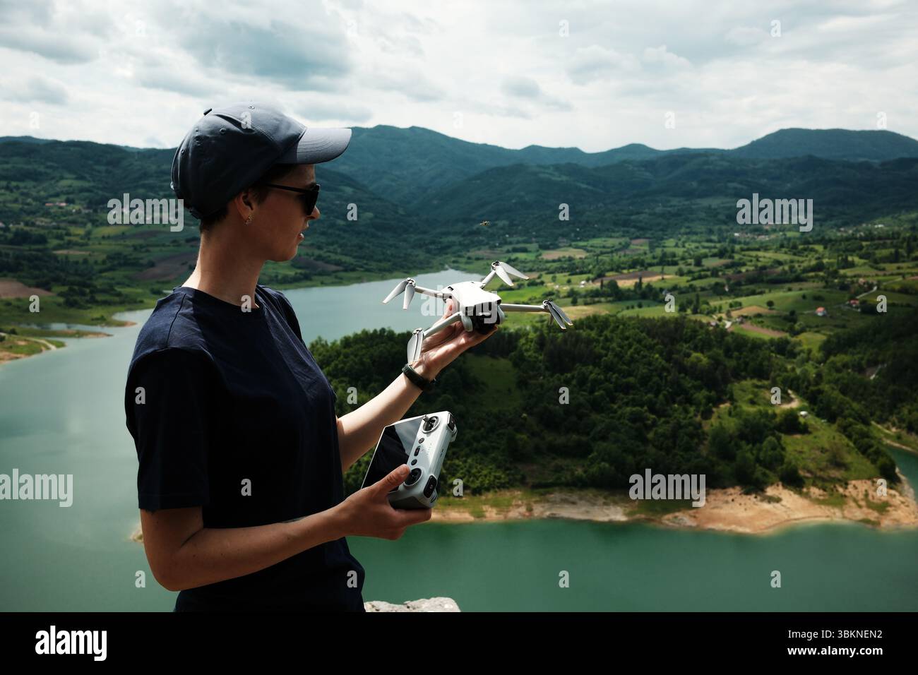 Woman holds drone remote controller hi-res stock photography and images - Alamy