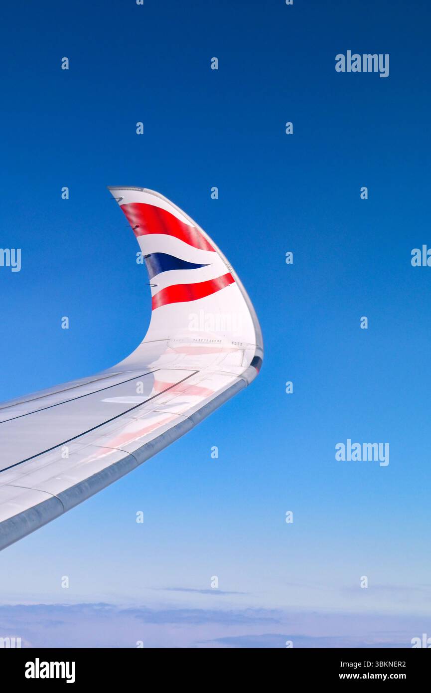 En route London to Denver, USA - 20 May 2025: Curved tip of a wing on a ...
