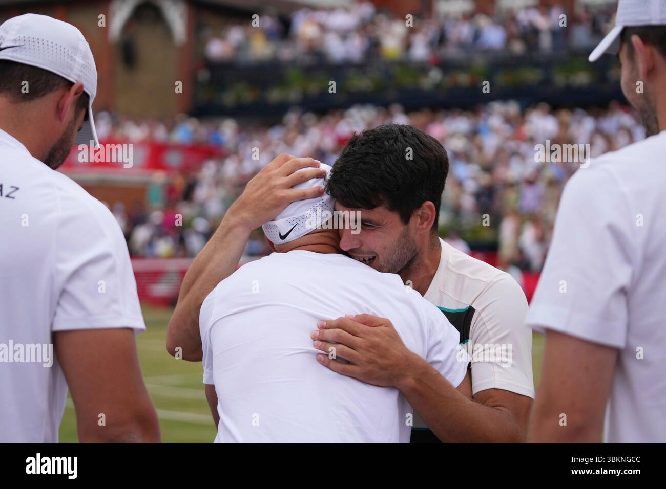 Carlos Alcaraz of Spain celebrates with his coaching team after ...
