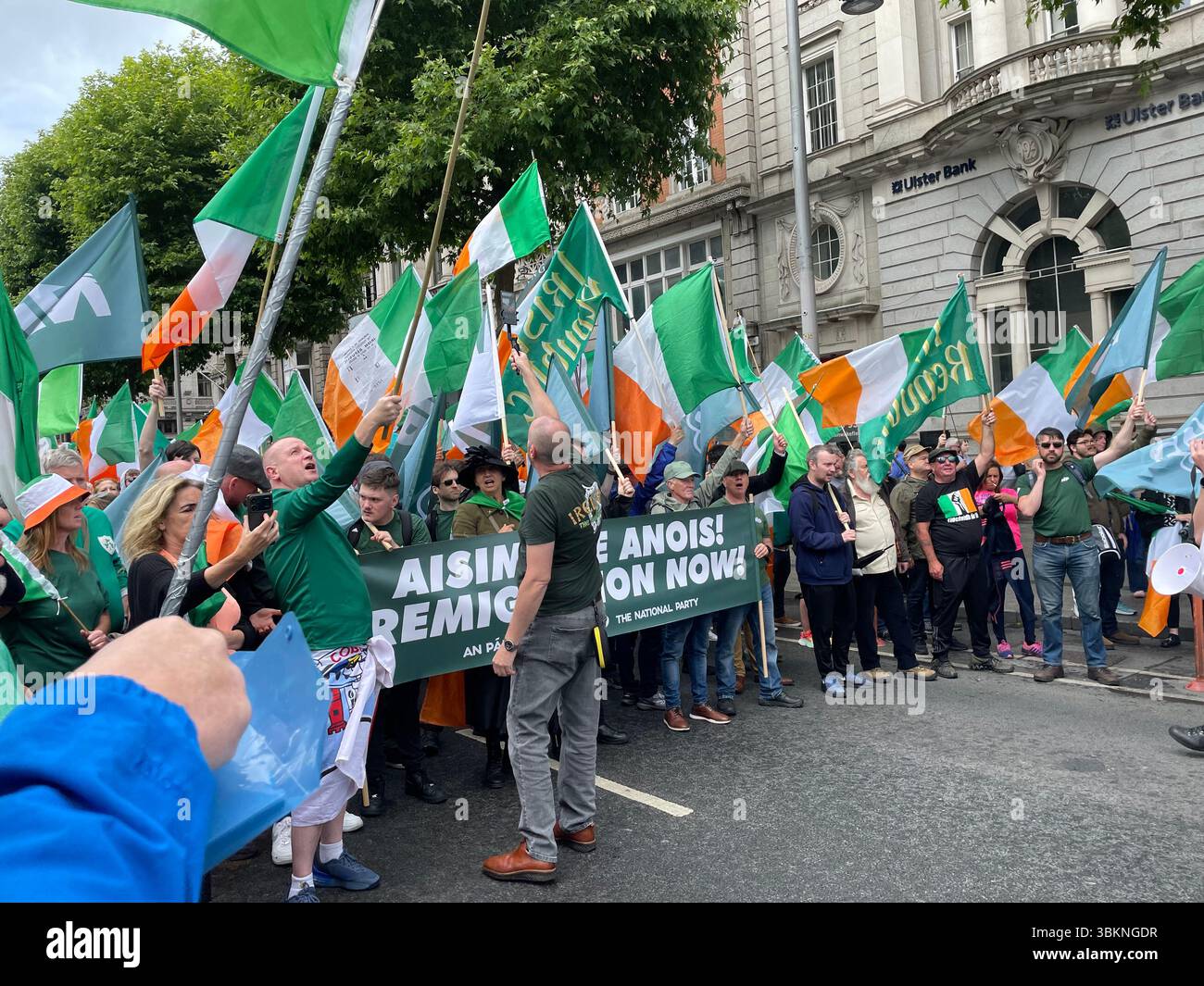 People take part in an anti-immigration demonstration in Dublin, near ...