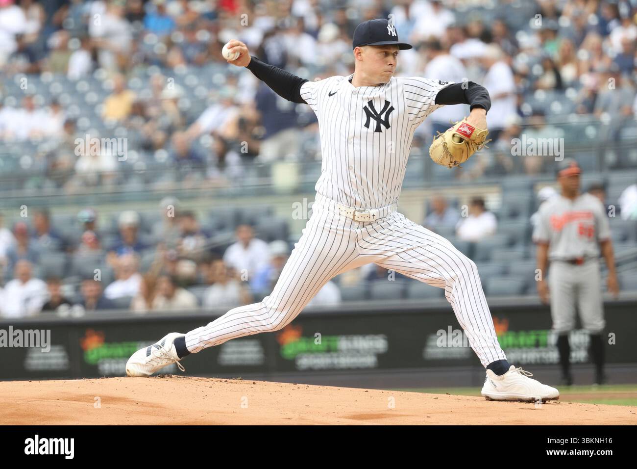 New York Yankees' Will Warren pitches during the first inning of a ...
