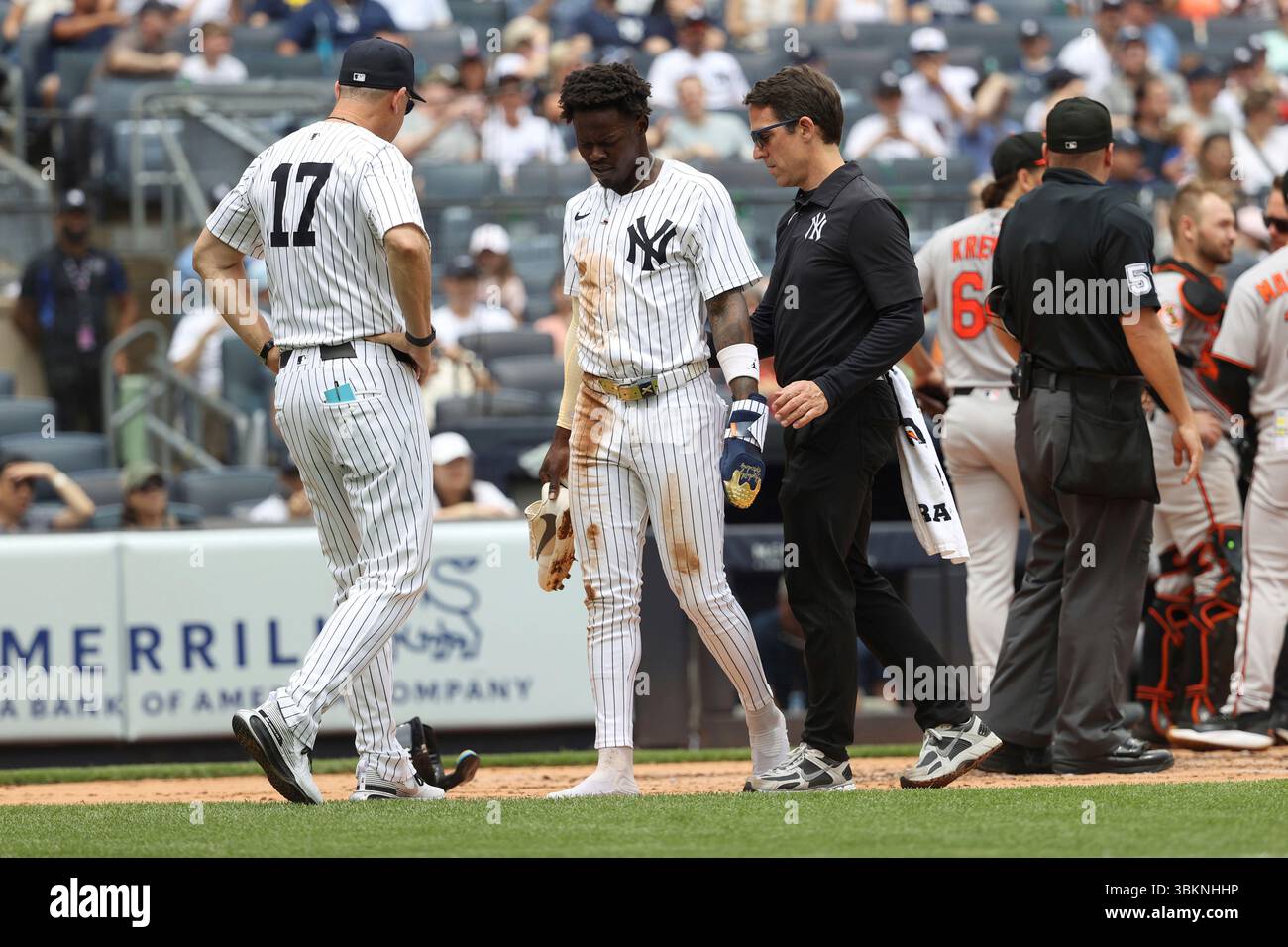 New York Yankees' Jazz Chisholm Jr. walks off the field after colliding ...