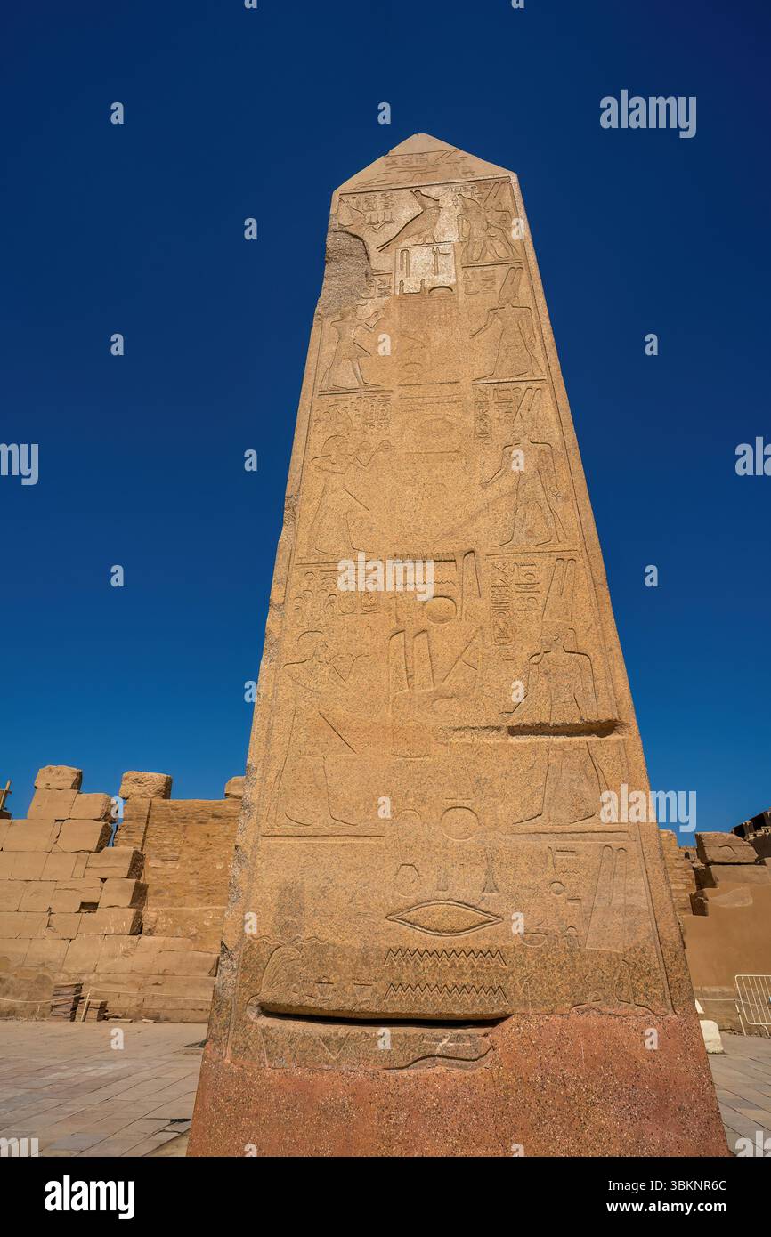 Ancient Egyptian obelisk in Luxor covered with hieroglyphic ...