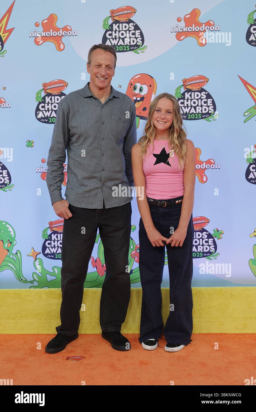 Tony Hawk and Katelyn West attends the 2025 Nickelodeon Kids' Choice ...