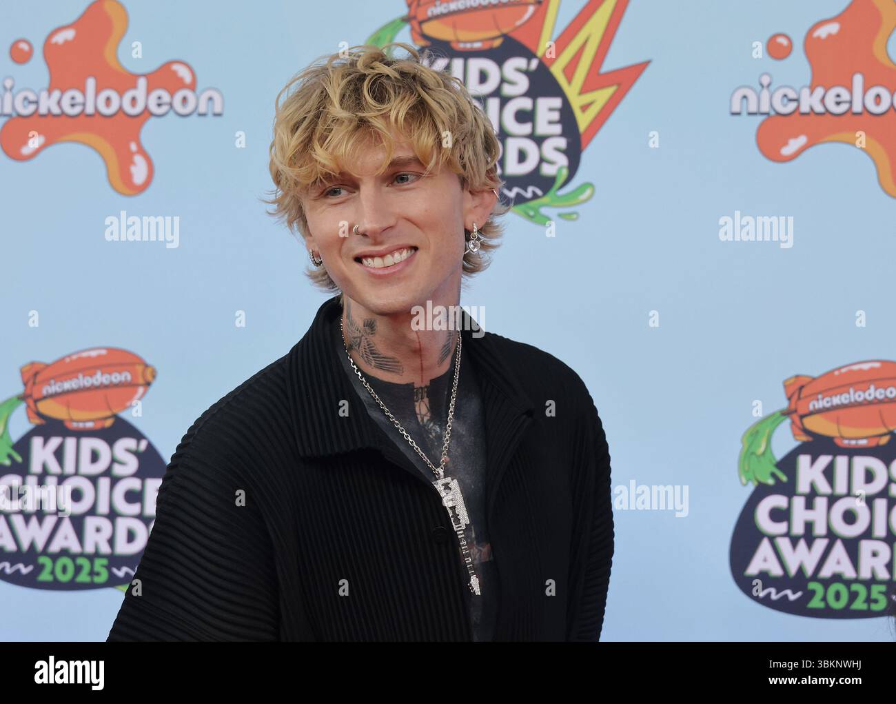 Santa Monica, USA. 22nd June, 2025. mgk attends the 2025 Nickelodeon Kids' Choice Awards at ...