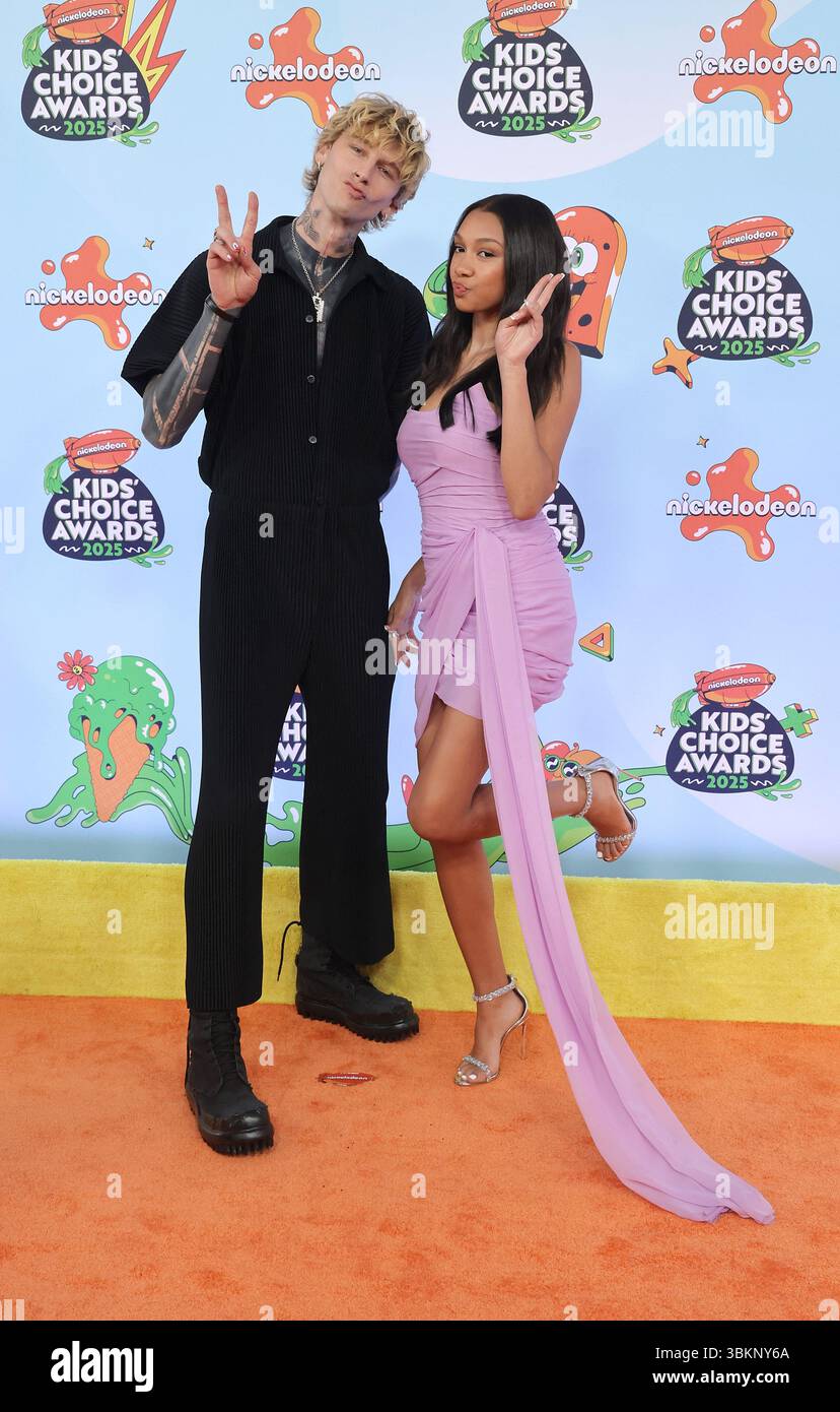 mgk, aka Machine Gun Kelly and Casie Baker attend the 2025 Nickelodeon Kids' Choice Awards at ...