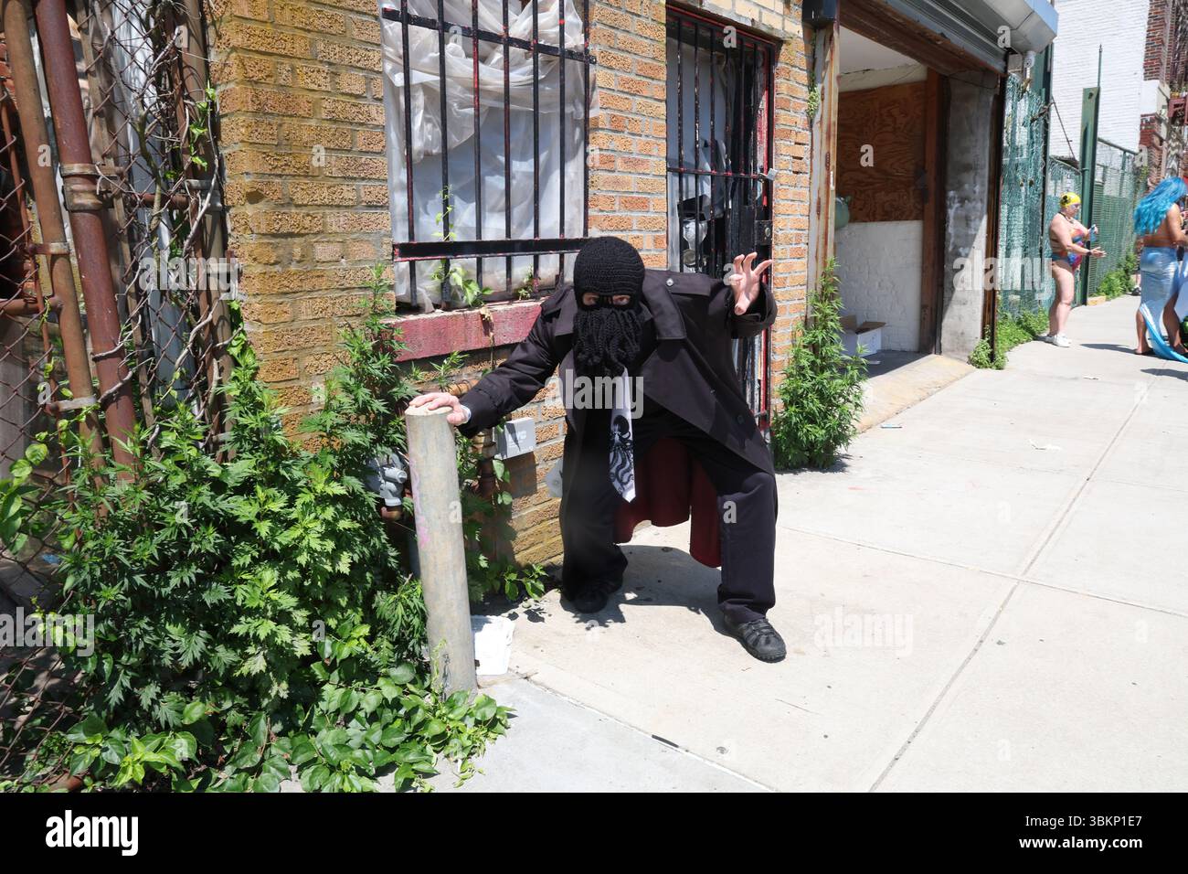 People dressed as mermaids and othet sea creatures pose for photos ...