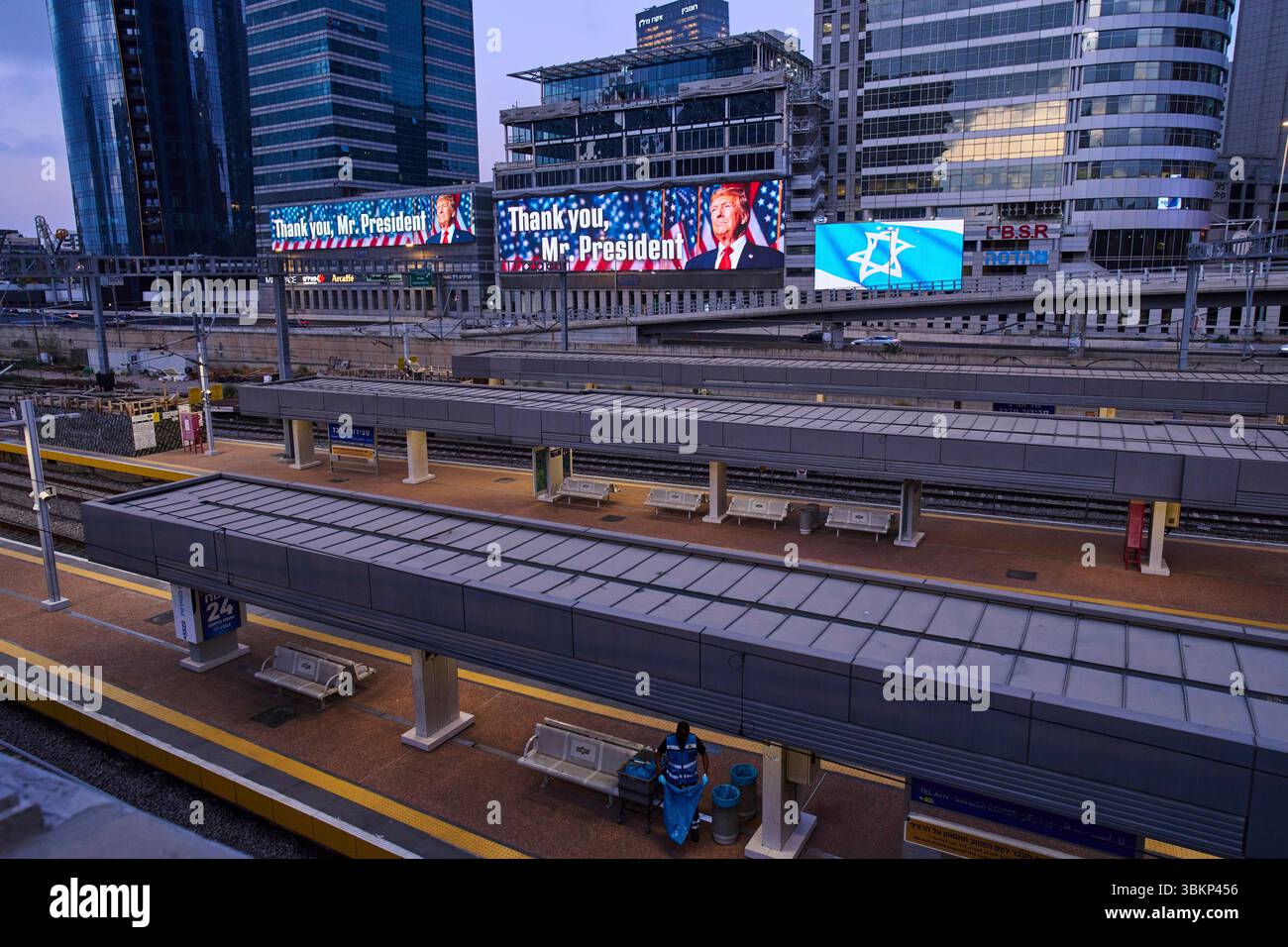 An electronic billboard beams an image of President Donald Trump ...