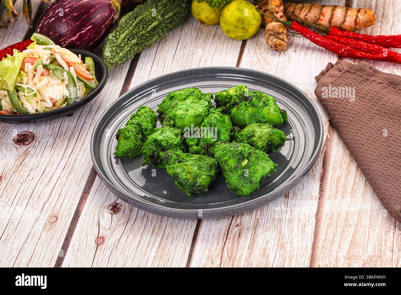 Indian green chicken mint tikka barbecue Stock Photo - Alamy