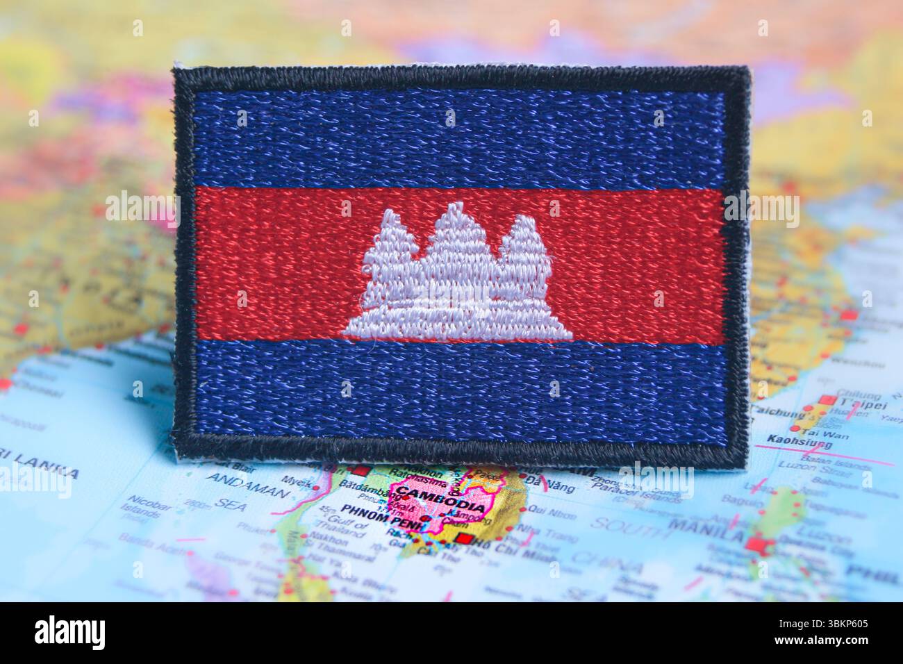 Cambodian eco friendly embroidered flag on world map, Southeast Asia ...