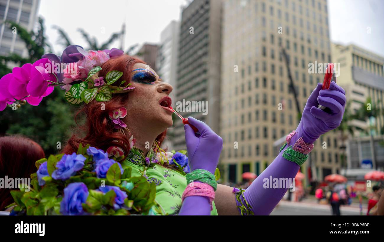 Sao Paulo, Brazil. 22nd June, 2025. Revelers pose for a picture during ...