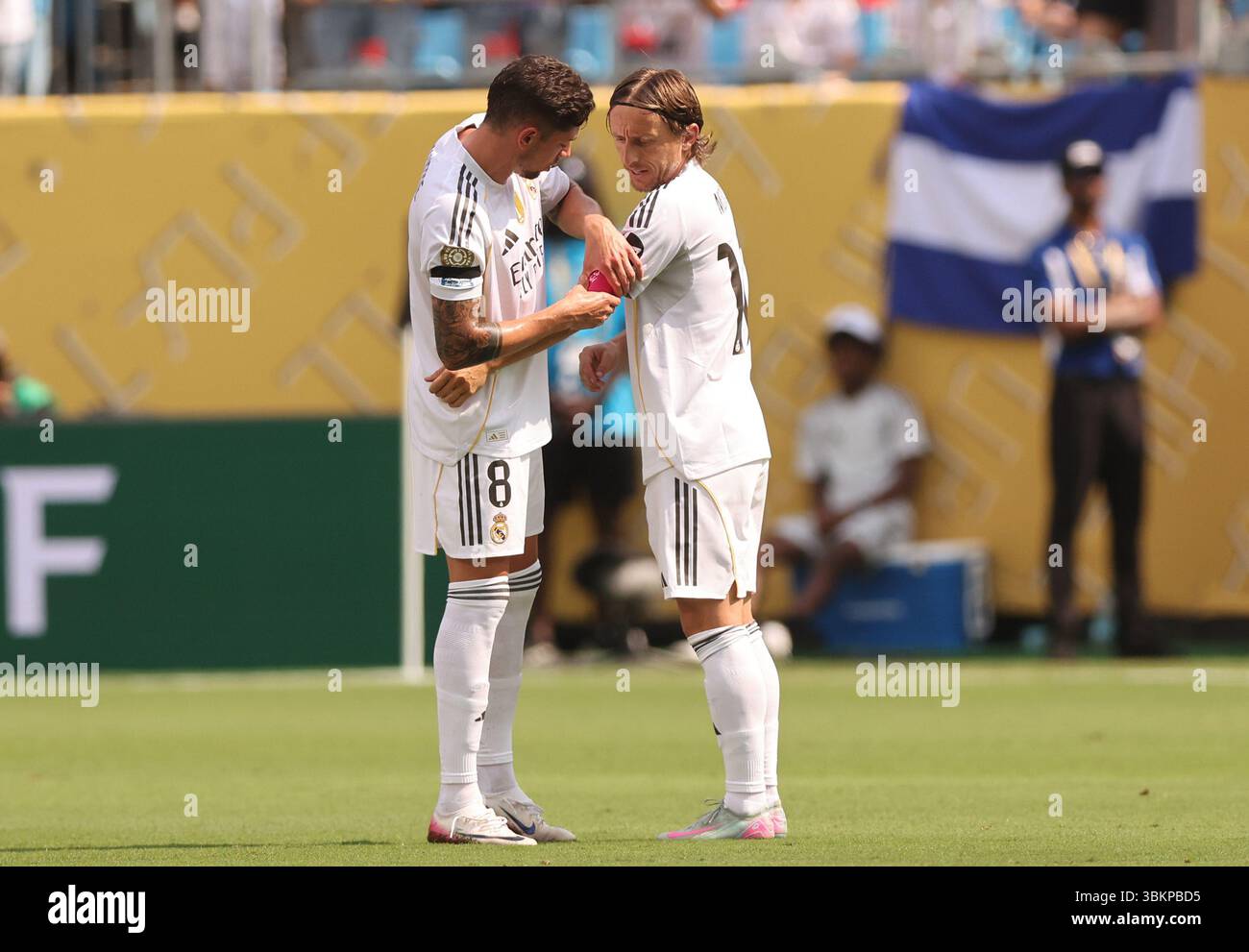 Charlotte, USA. 22nd June, 2025. Luka Modric of Real Madrid (r) is ...