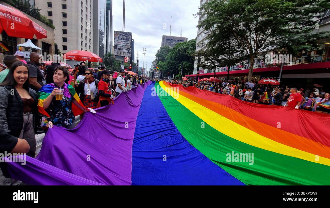 Sao Paulo, Brazil. 22nd June, 2025. Revelers pose for a picture during ...