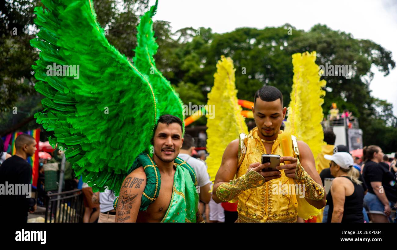 Sao Paulo, Brazil. 22nd June, 2025. Revelers pose for a picture during ...
