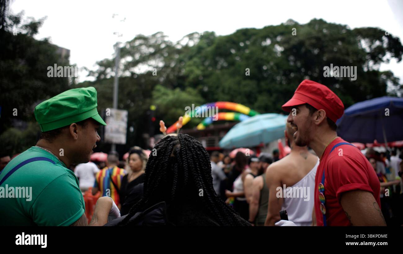 Sao Paulo, Brazil. 22nd June, 2025. Revelers pose for a picture during ...