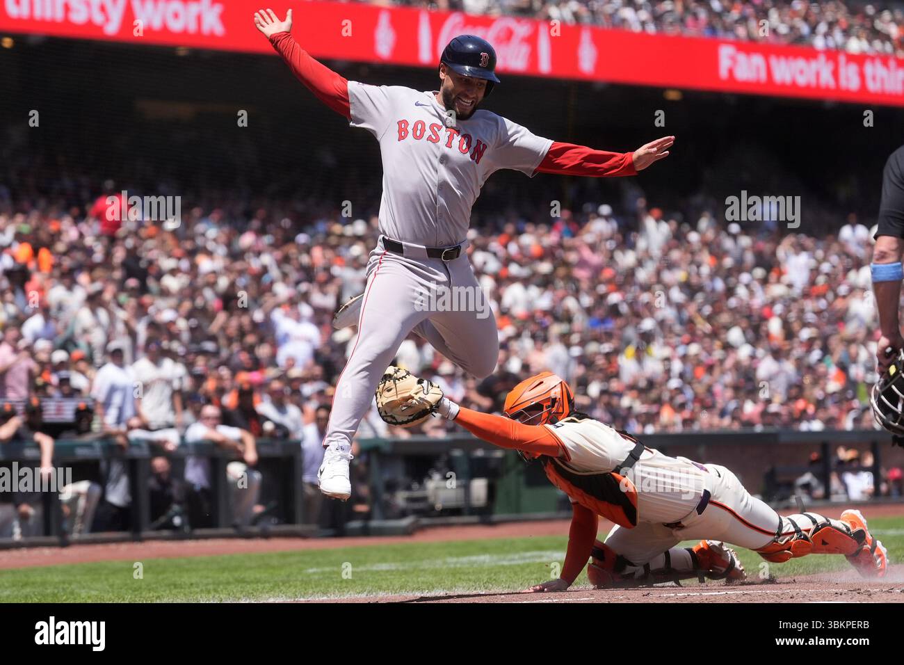 Boston Red Sox's Abraham Toro, left, is called out at home as San ...