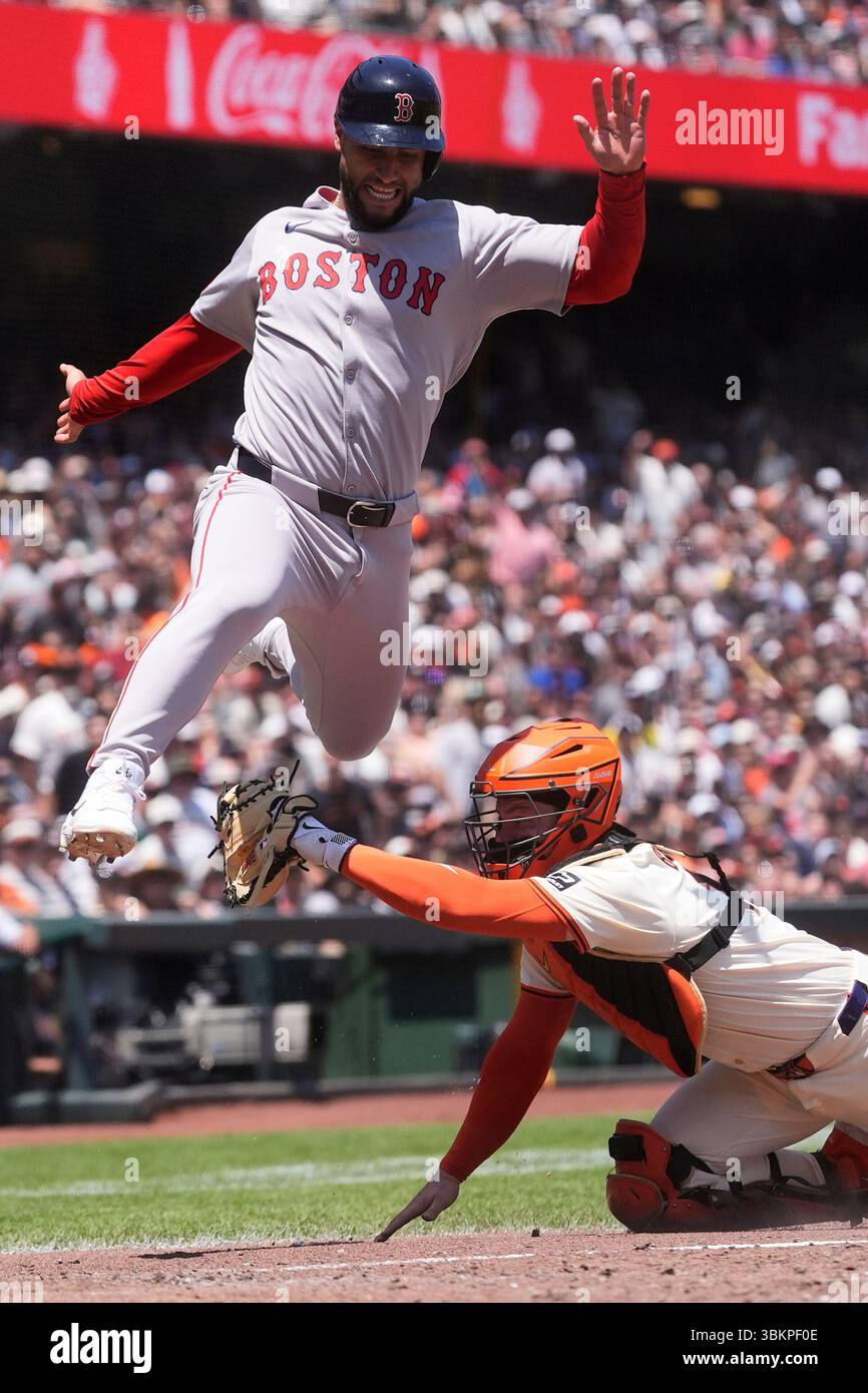 Boston Red Sox's Abraham Toro, left, is called out at home as San ...