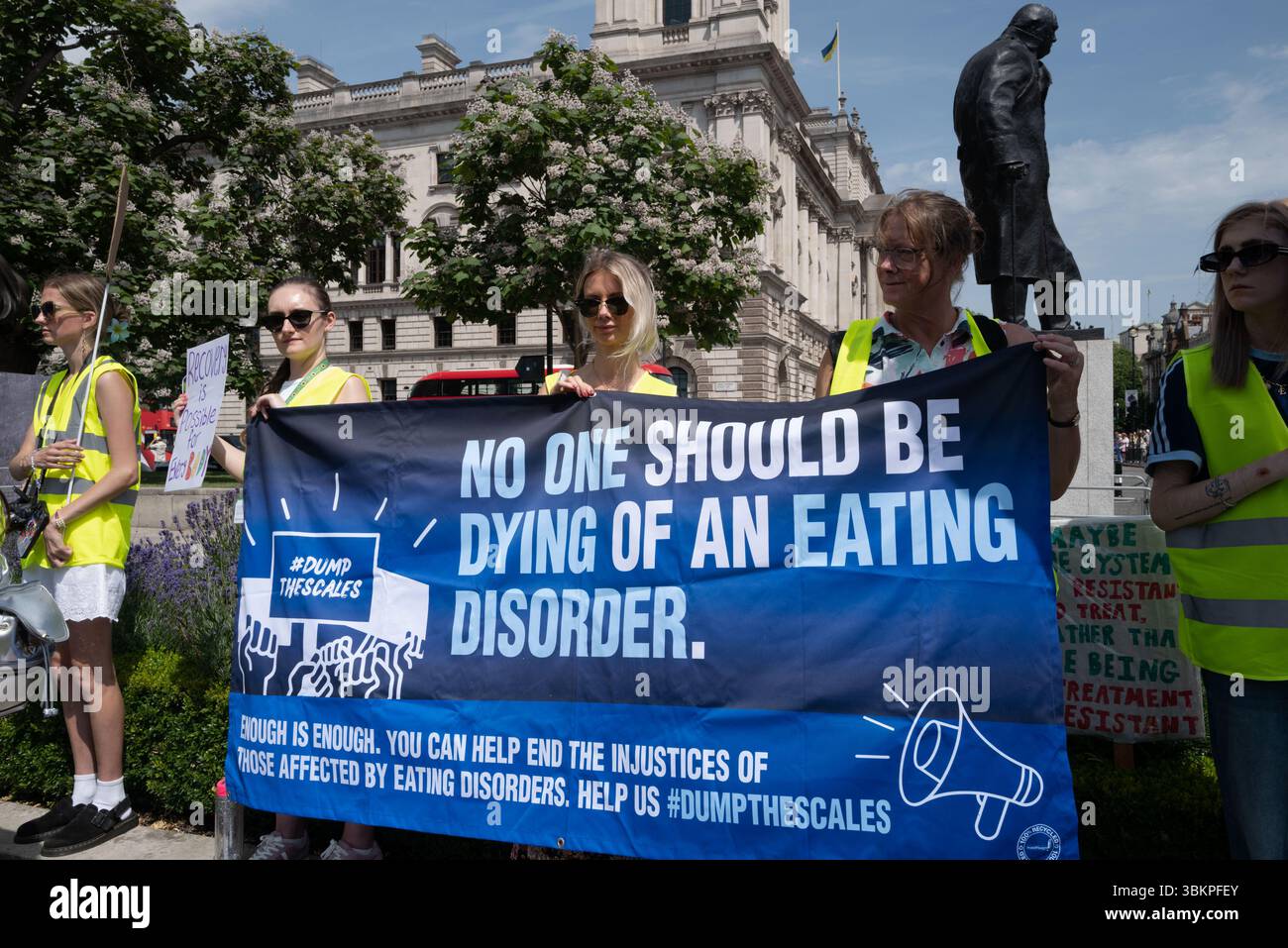 London, UK. 21st June, 2025. Supporters of eating disorder reform ...