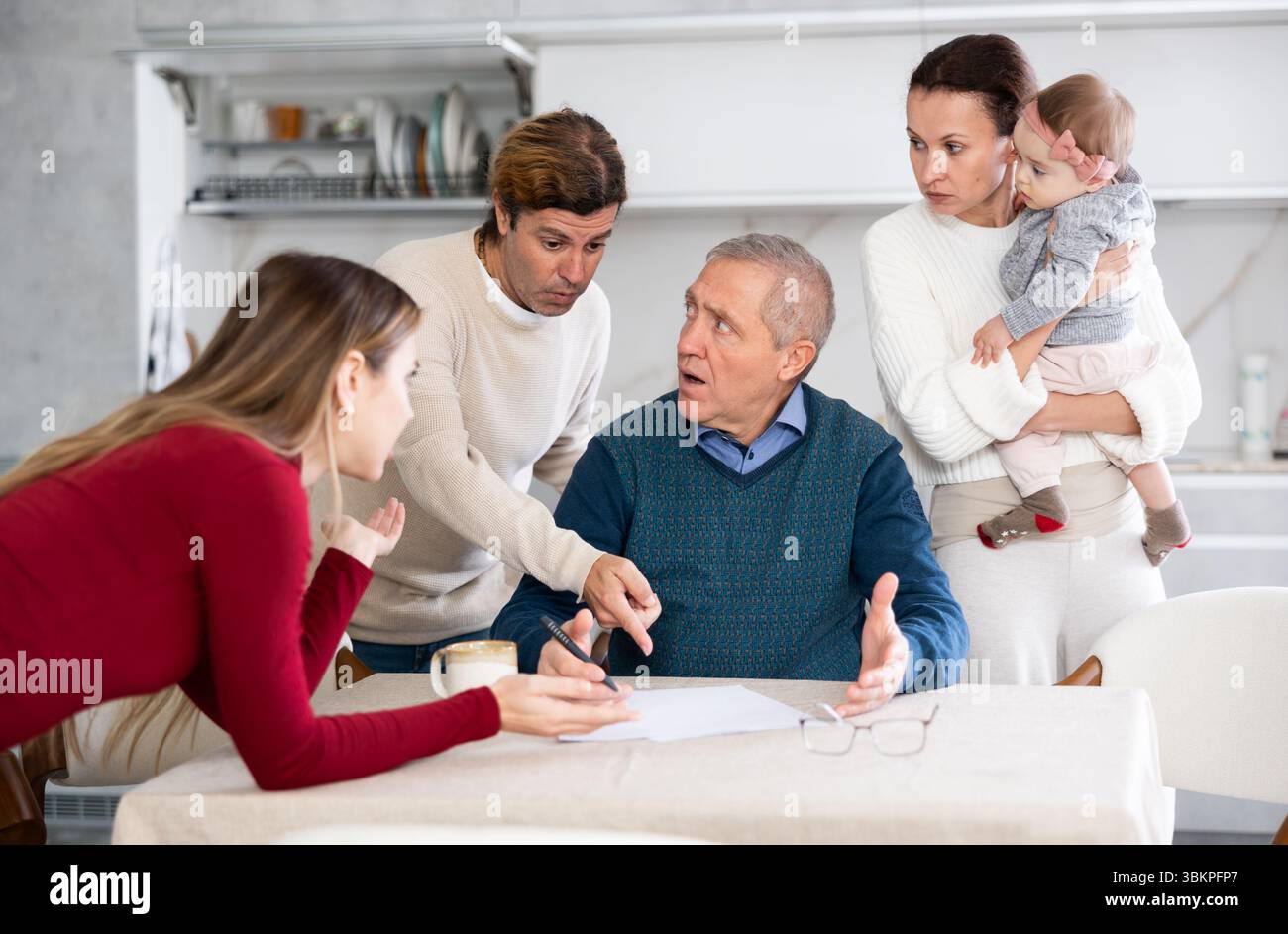 Family members discussing inheritance Stock Photo - Alamy