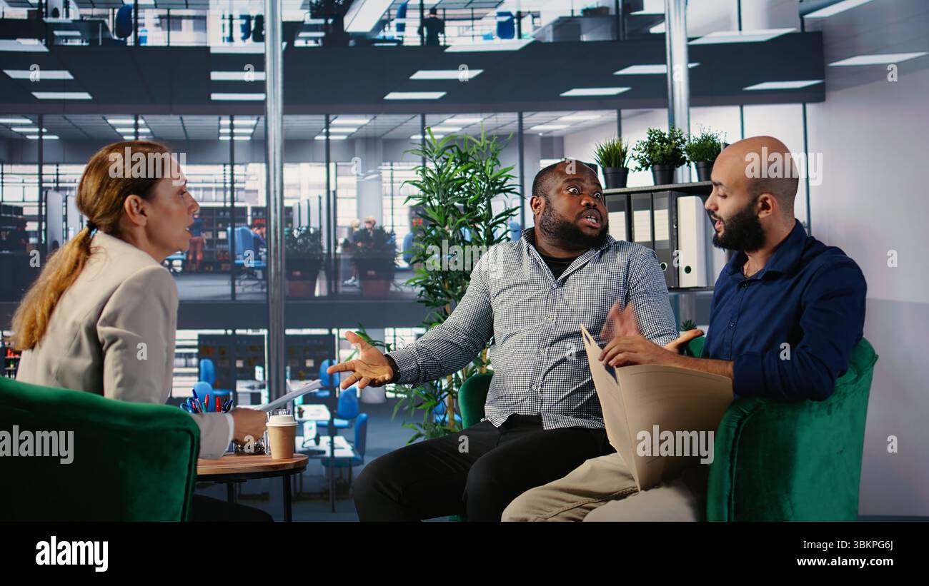 Multiethnic professionals in heated argument hi-res stock photography ...