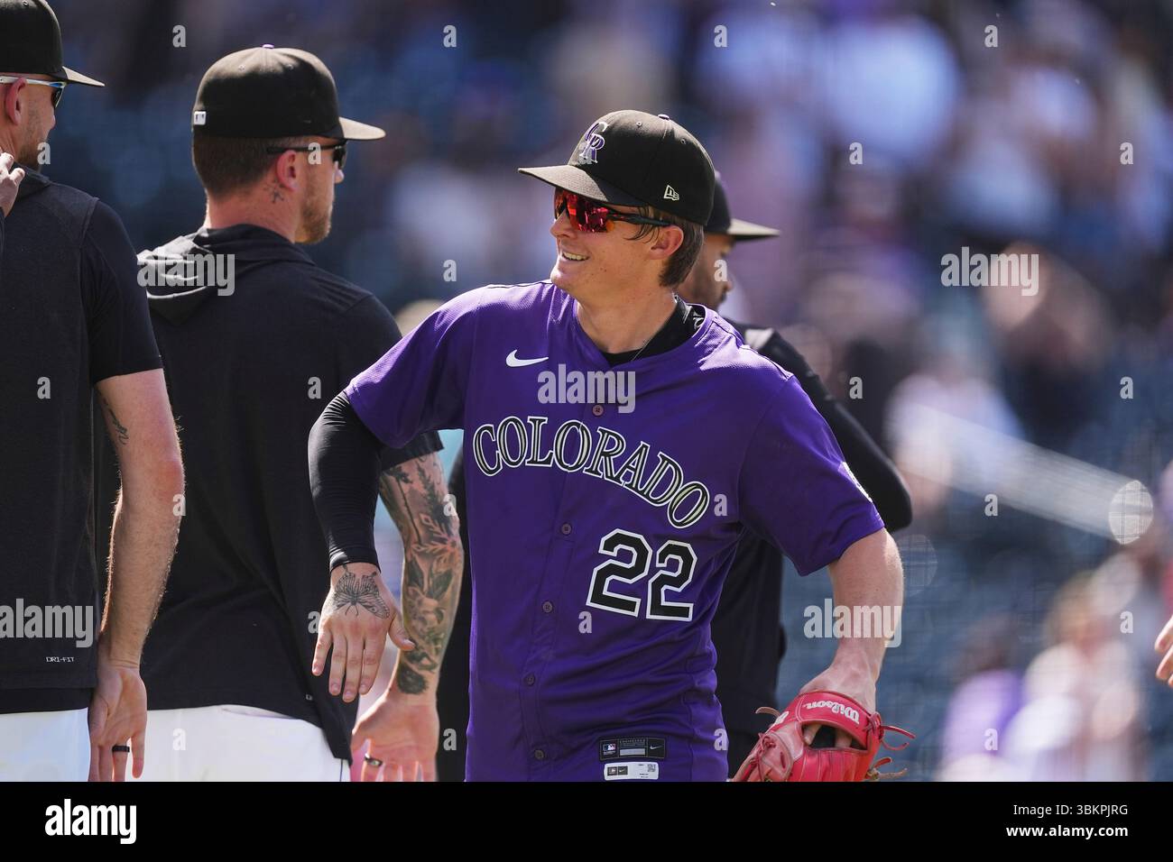 Colorado Rockies right fielder Mickey Moniak is congratulated after ...