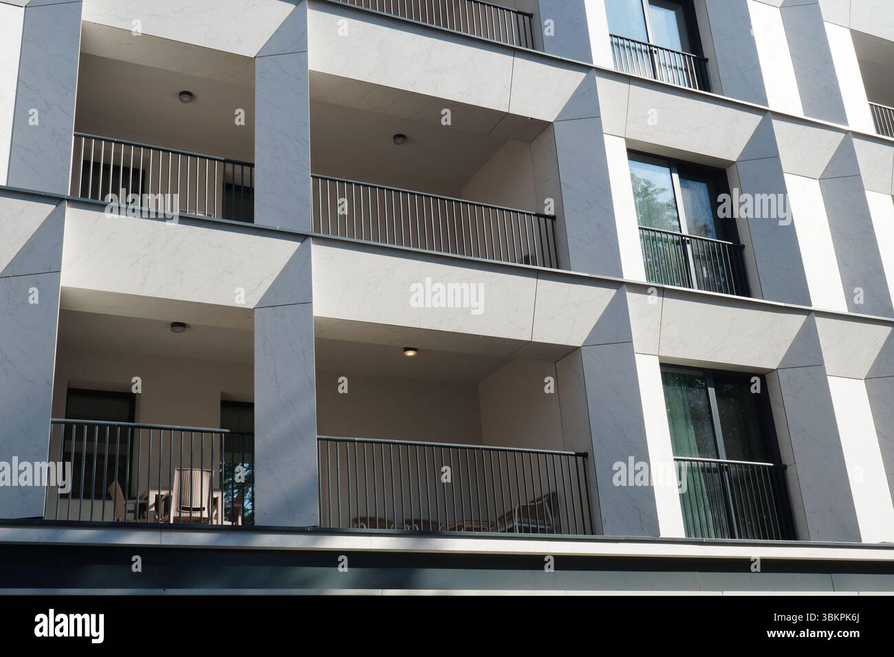 Facade of block of apartments in Bucharest, with balconies and windows ...