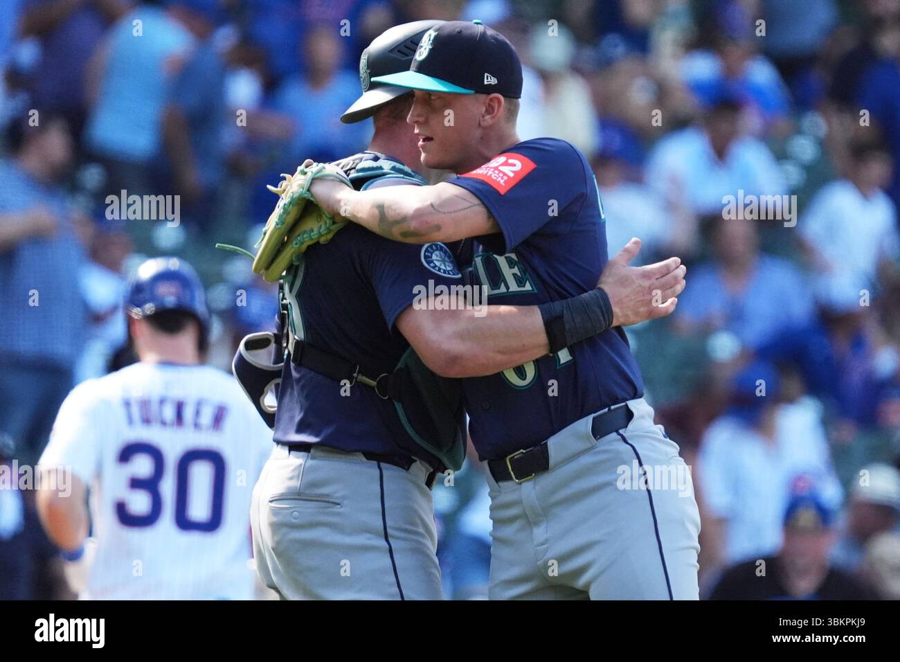 Seattle Mariners catcher Mitch Garver, left, celebrates with relief ...