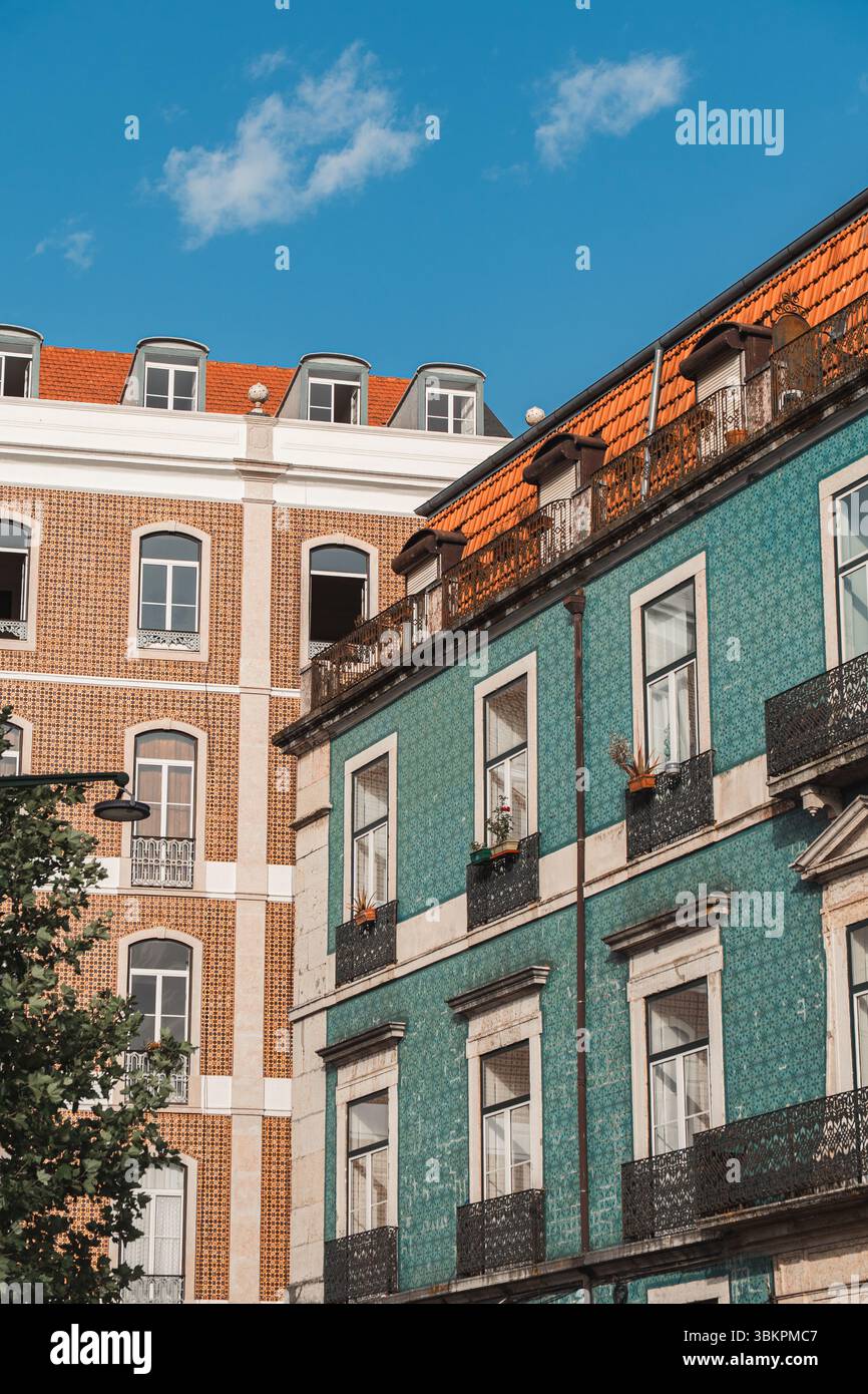 Vibrant Lisbon buildings with iconic azulejo tiles and red rooftops ...