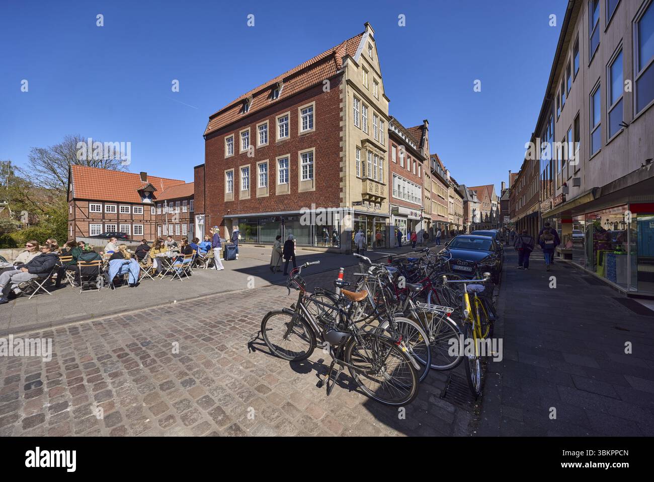 Old town, historic buildings, gables, bicycles, cobblestone street ...