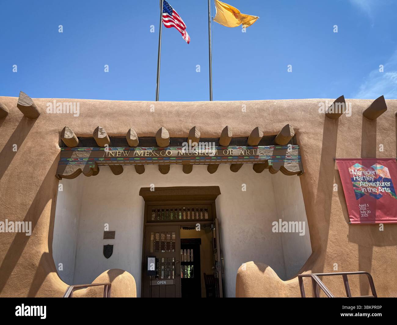 Close up of Entrance to the New Mexico Museum of Art, with viga tails ...
