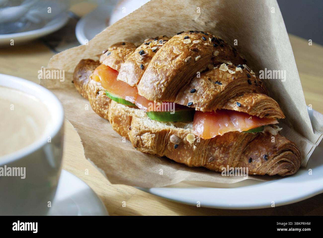 Croissant fish sandwich cappuccino hi-res stock photography and images ...