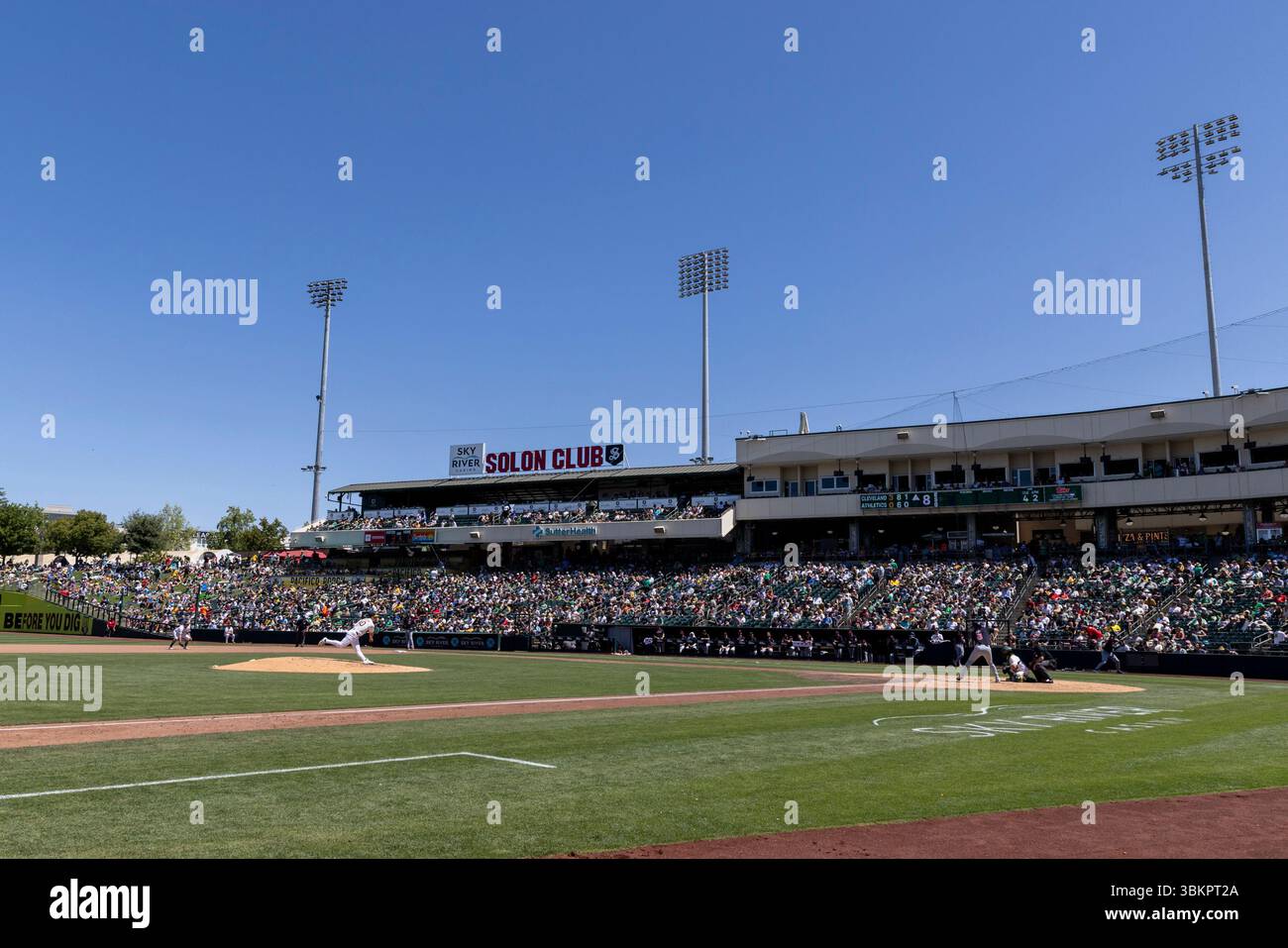 Athletics pitcher JP Sears throws to the Cleveland Guardians during the ...