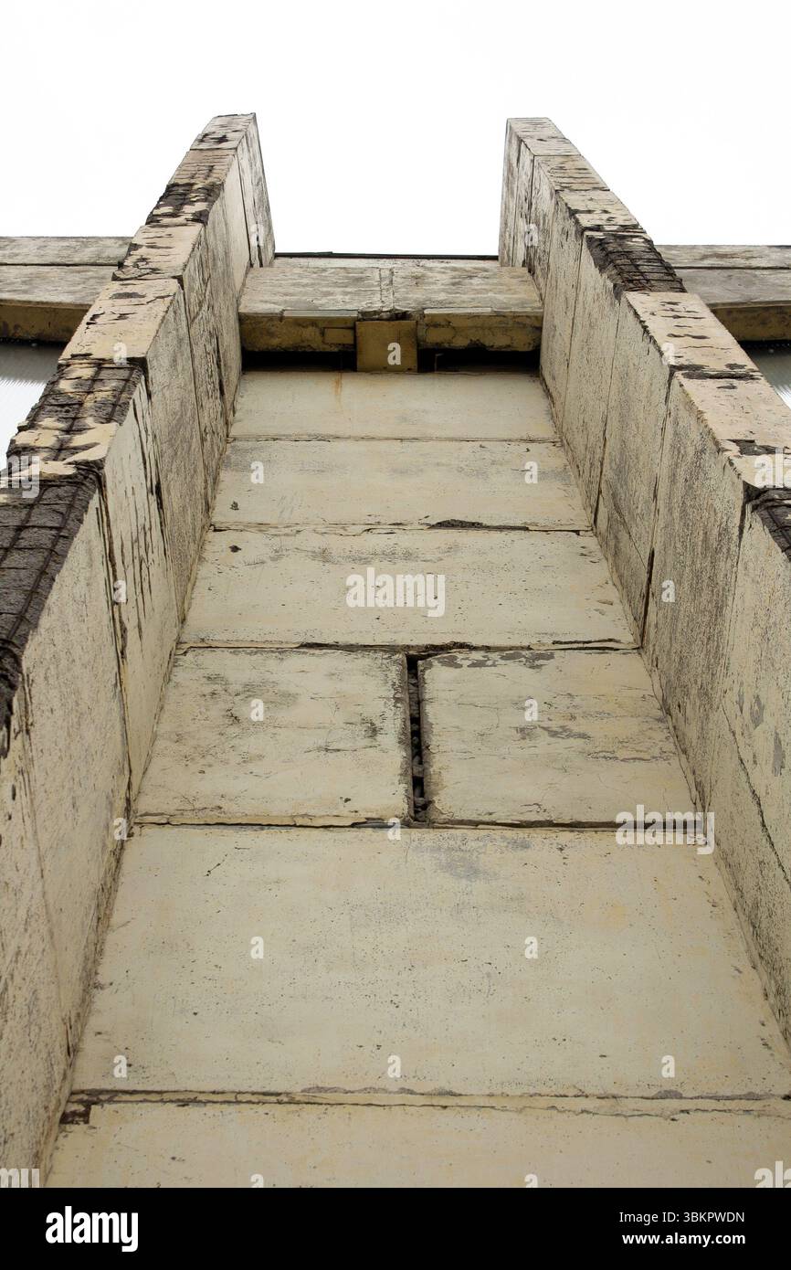 High concrete structure, factory building, bottom view Stock Photo - Alamy