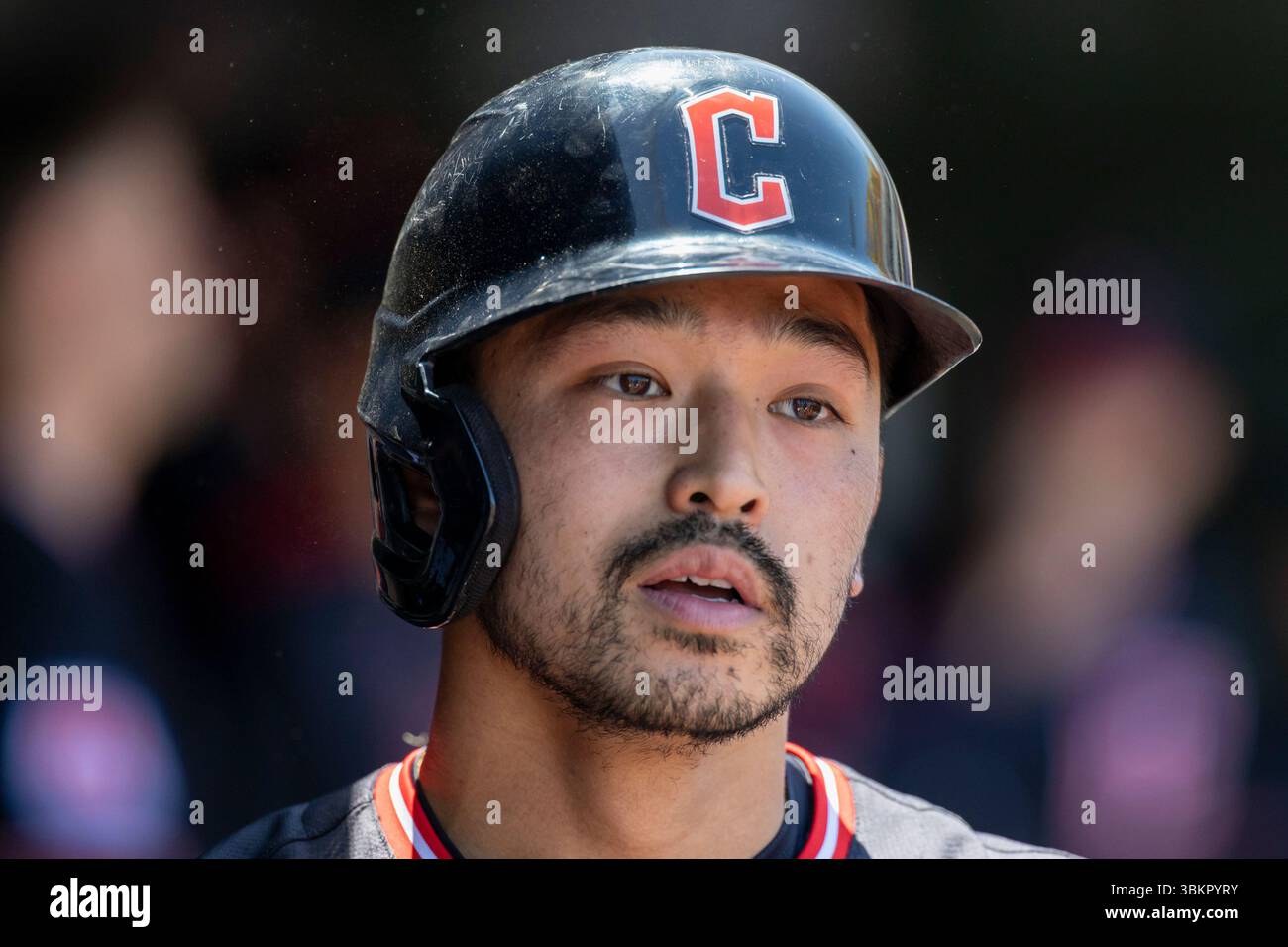 Cleveland Guardians outfielder Steven Kwan looks out from the dugout ...