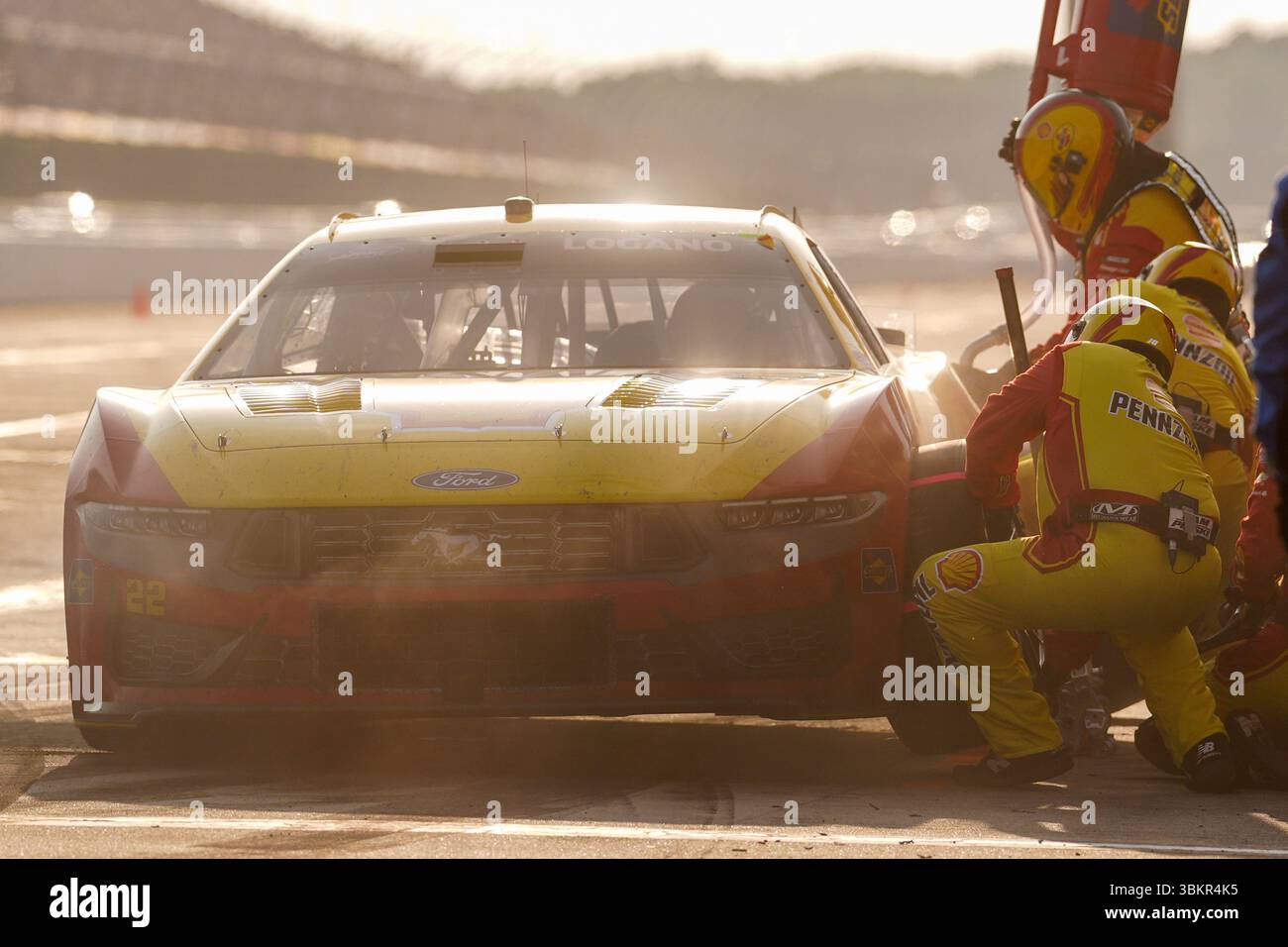 Joey Logano makes a pit stop during a NASCAR Cup Series auto race at ...