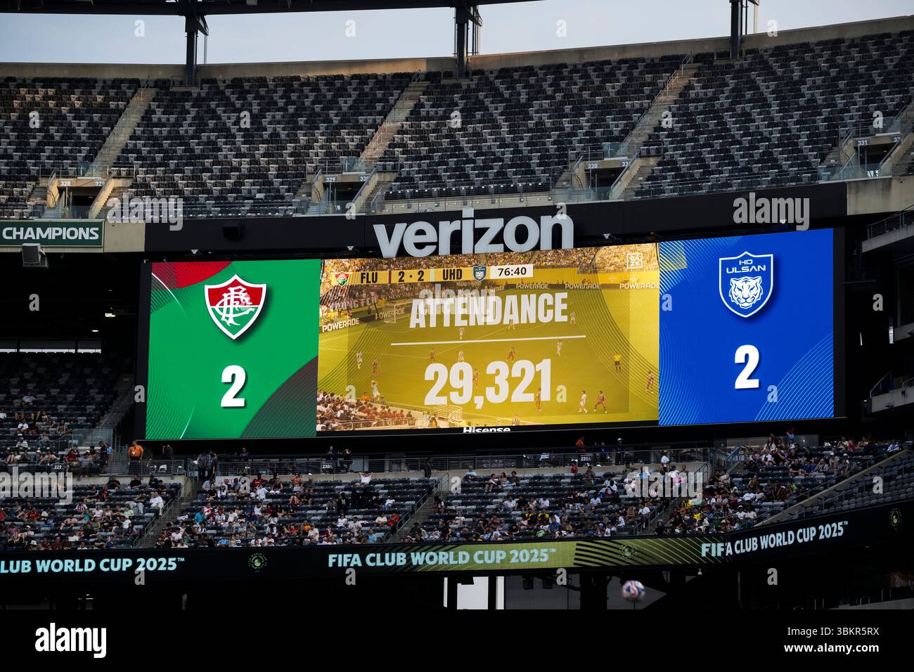 A giant screen displays the attendance (29321) during the FIFA Club ...
