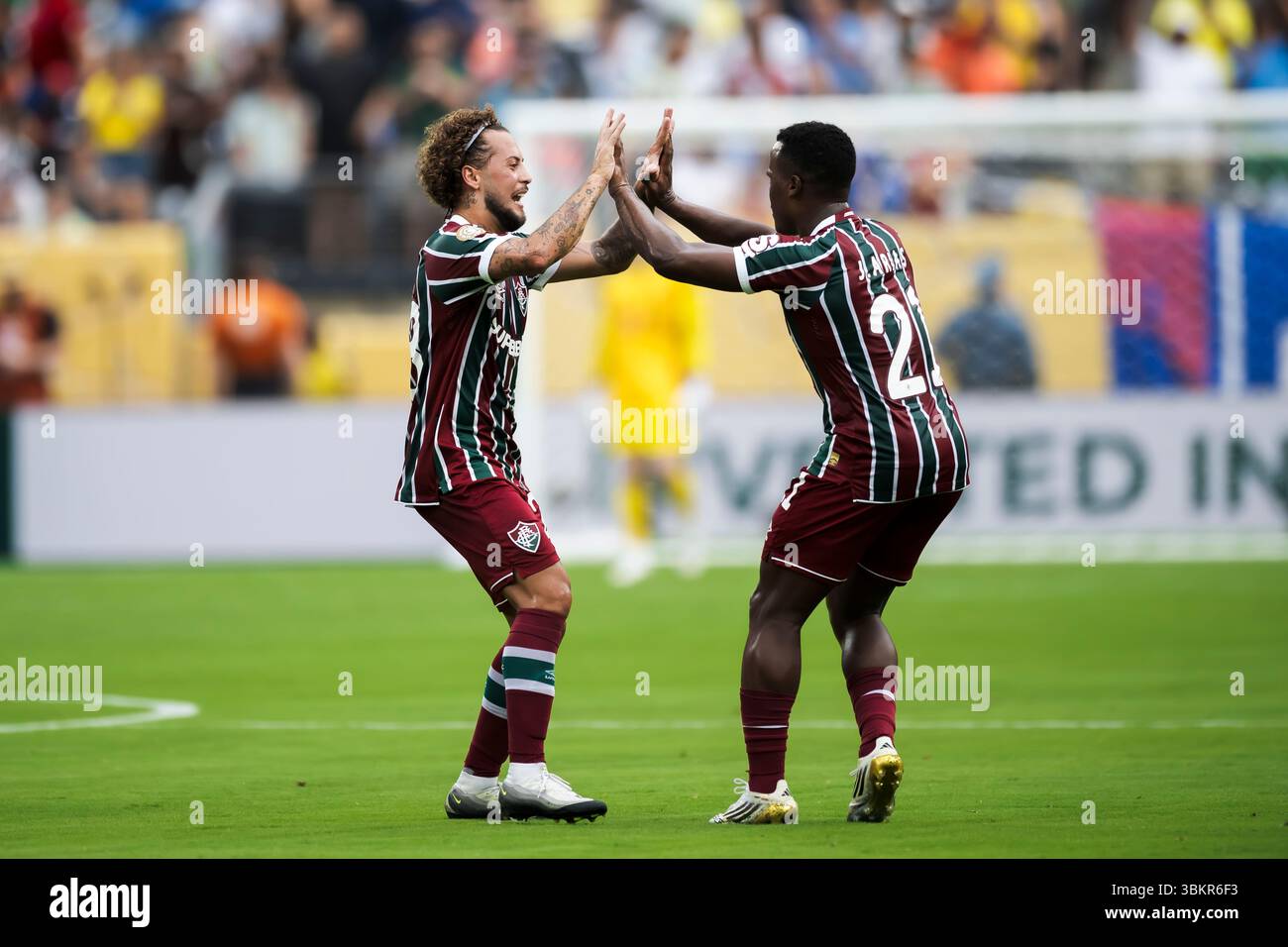 Jhon Arias of Fluminense FC celebrates with Guga of Fluminense FC after ...