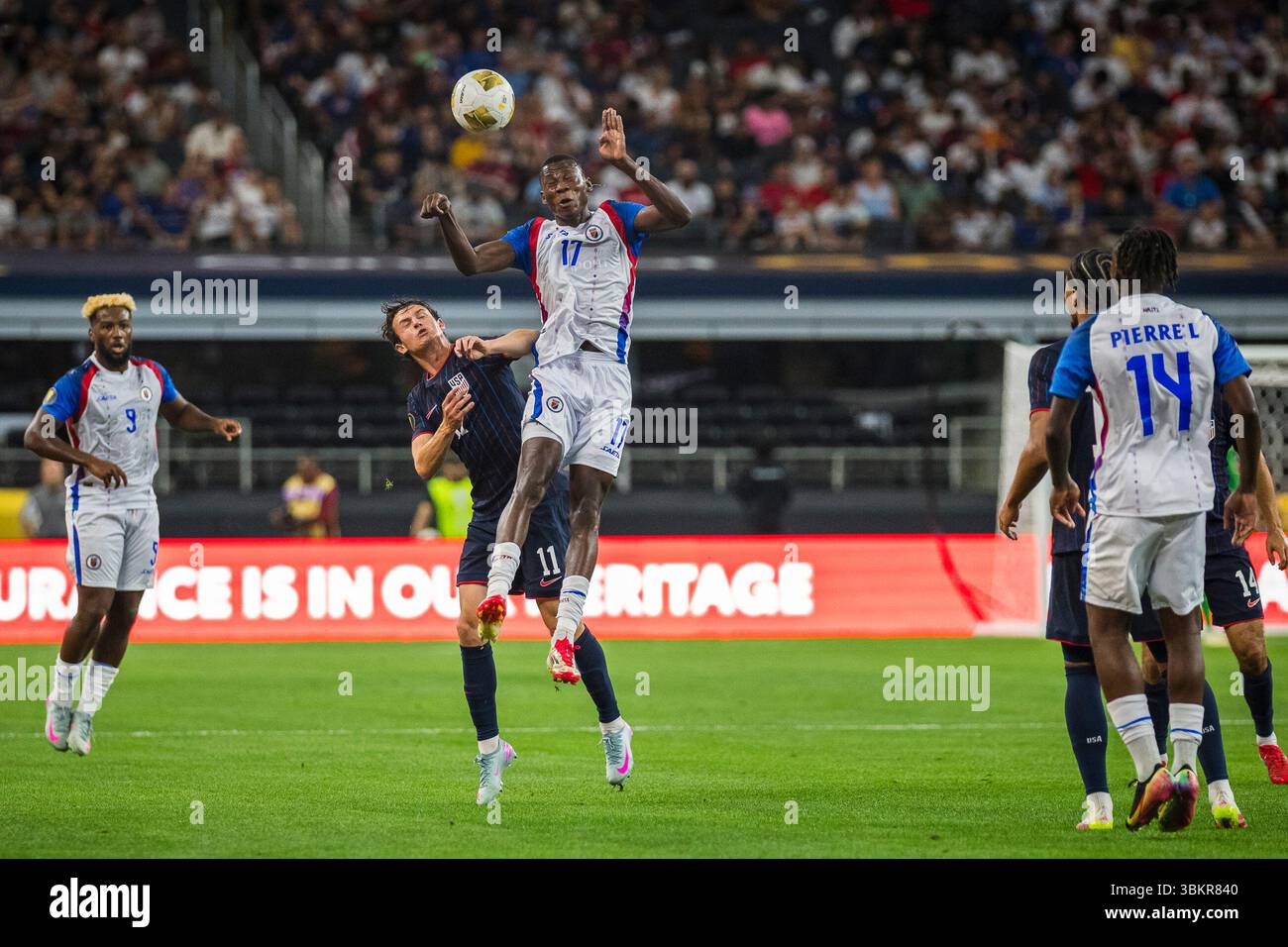 Haiti midfielder Danley Jean (17) and United States midfielder Brenden ...