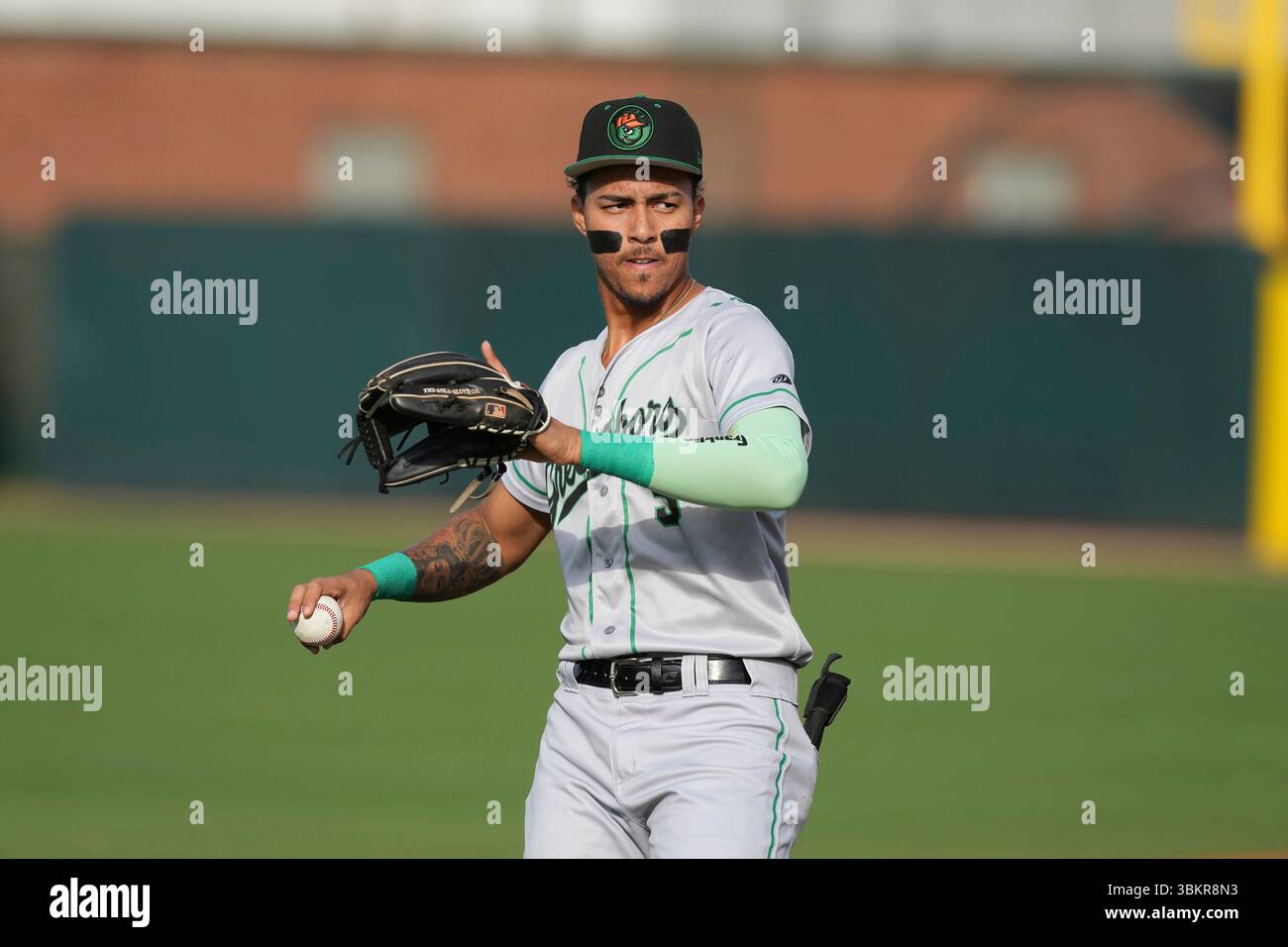 Javier Rivas (5) of the Greensboro Grasshoppers warms up before a South ...