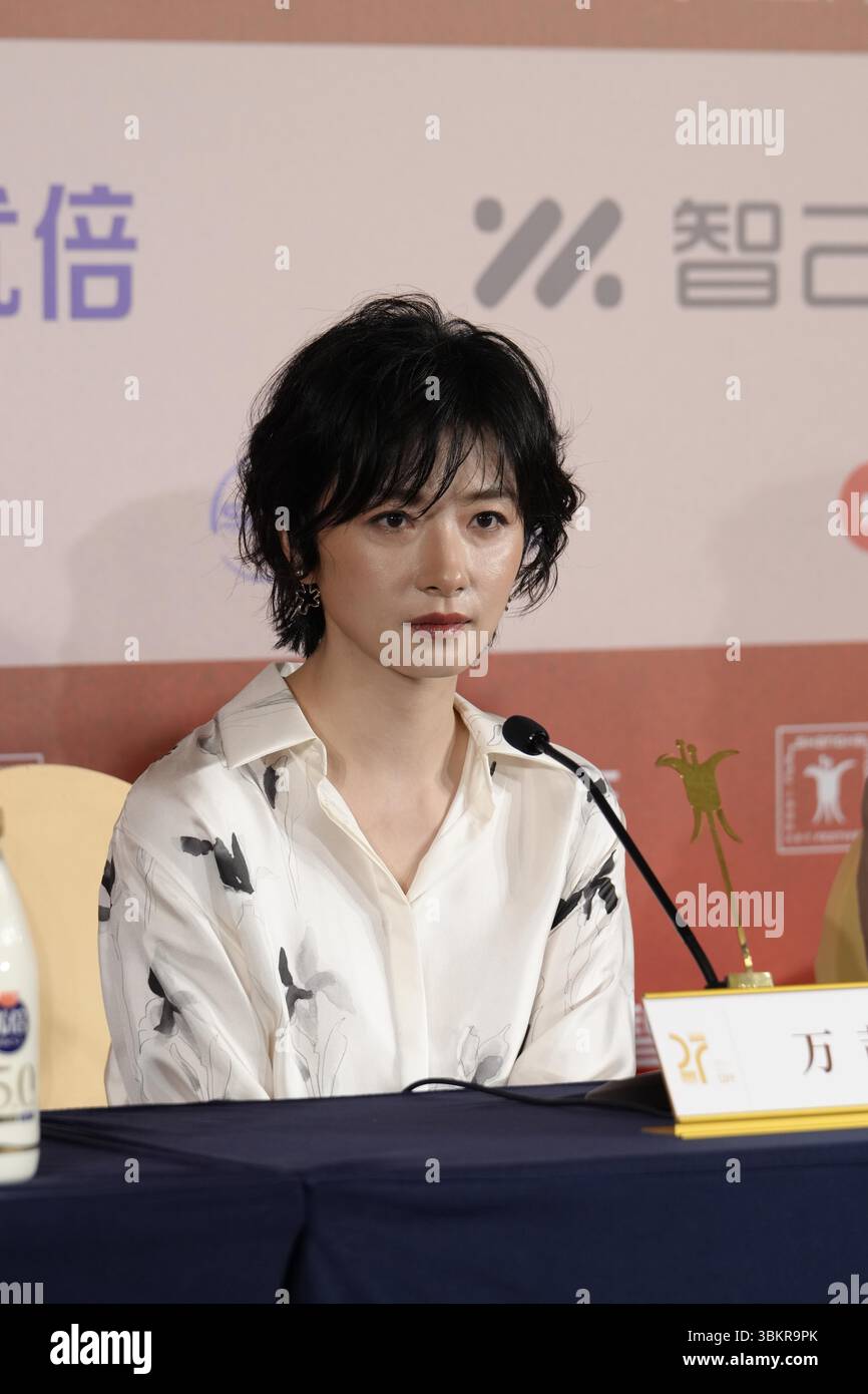 Chinese actress and singer Wan Qian attends an activity in Shanghai ...
