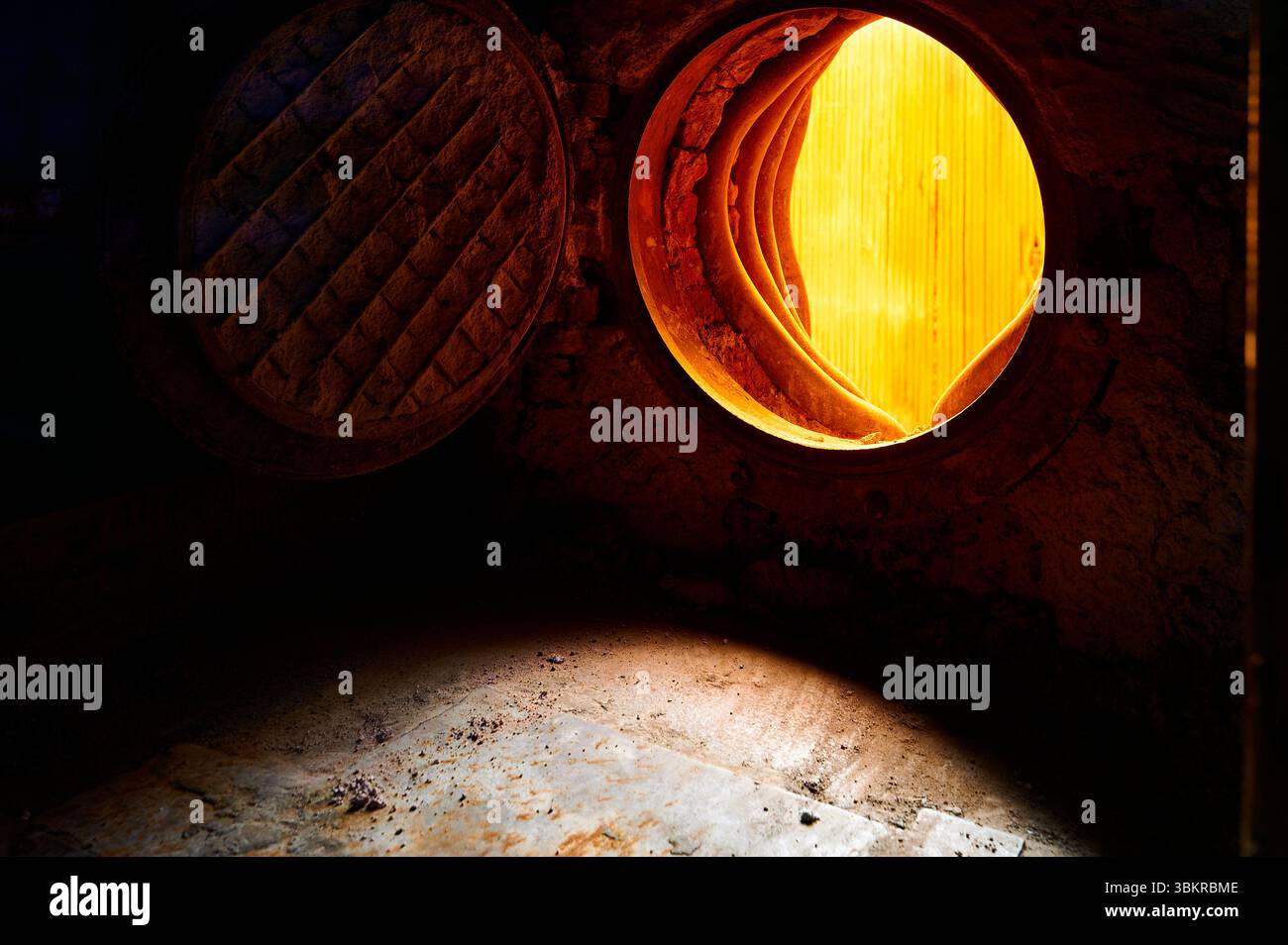 Interior view of operating steam boiler furnace showing intense flame ...