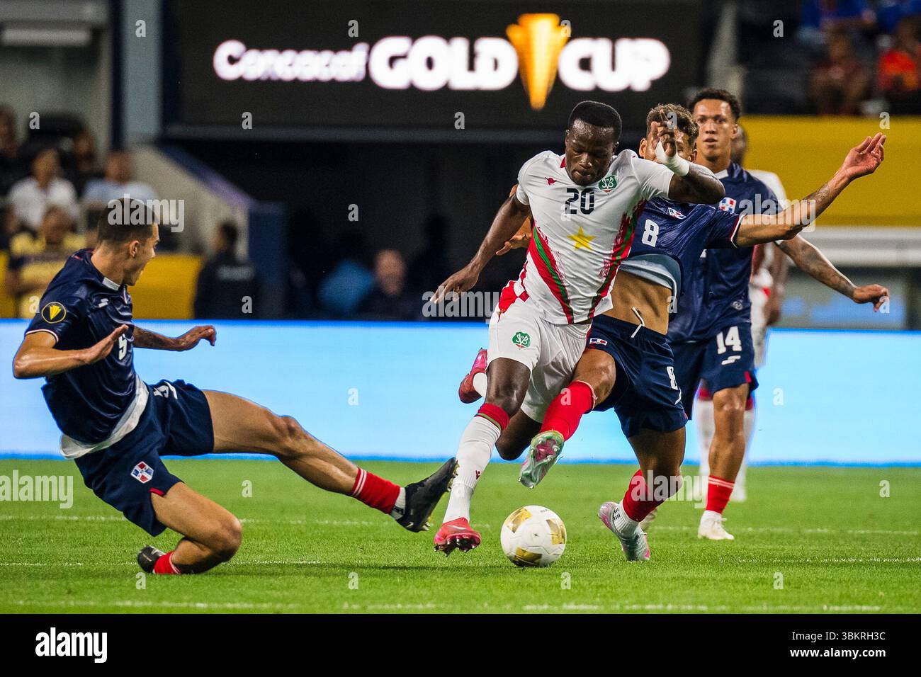 Dominican Republic defender Noah Dollenmayer (5), Suriname forward ...