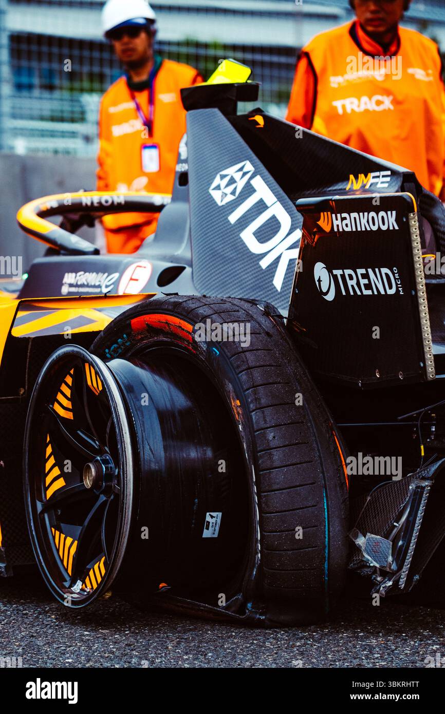 The crashed car of Neom McLaren driver Taylor Barnard being tended to ...